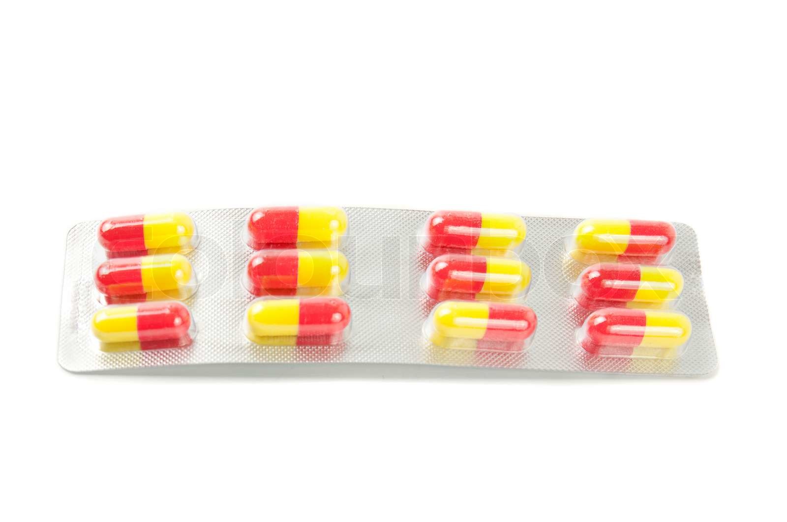 Package with yellow-red tablets | Stock image | Colourbox