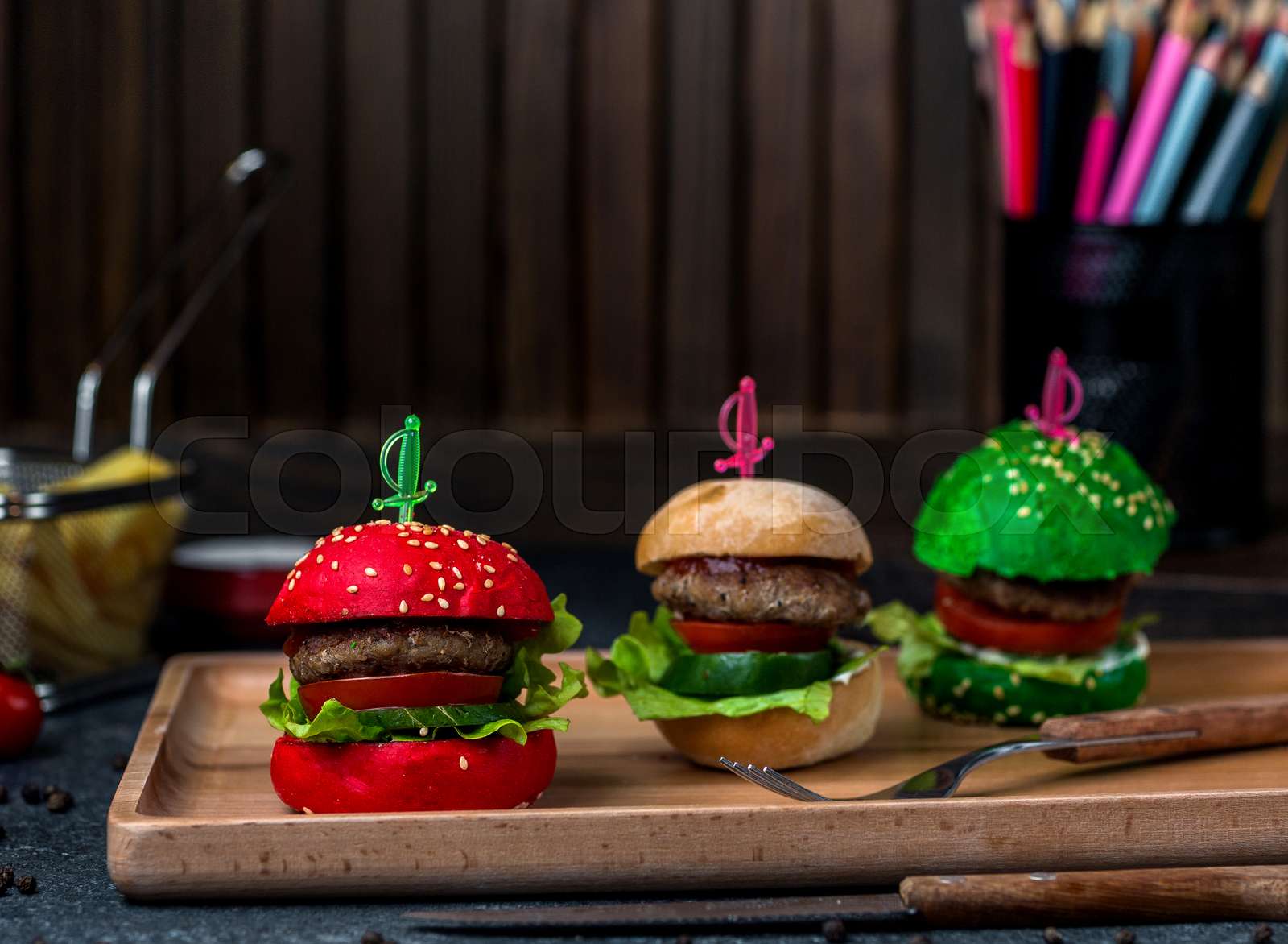mini burgers with coloured buns | Stock image | Colourbox