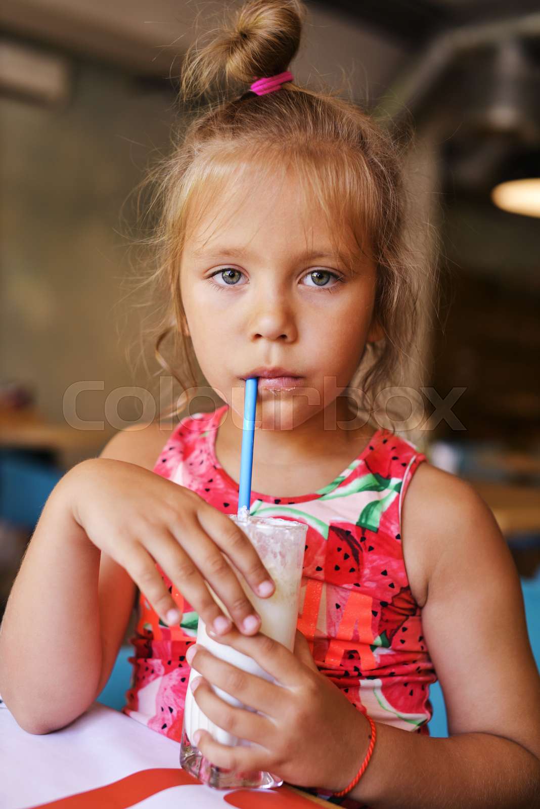 girl drinking milkshake | Stock image | Colourbox