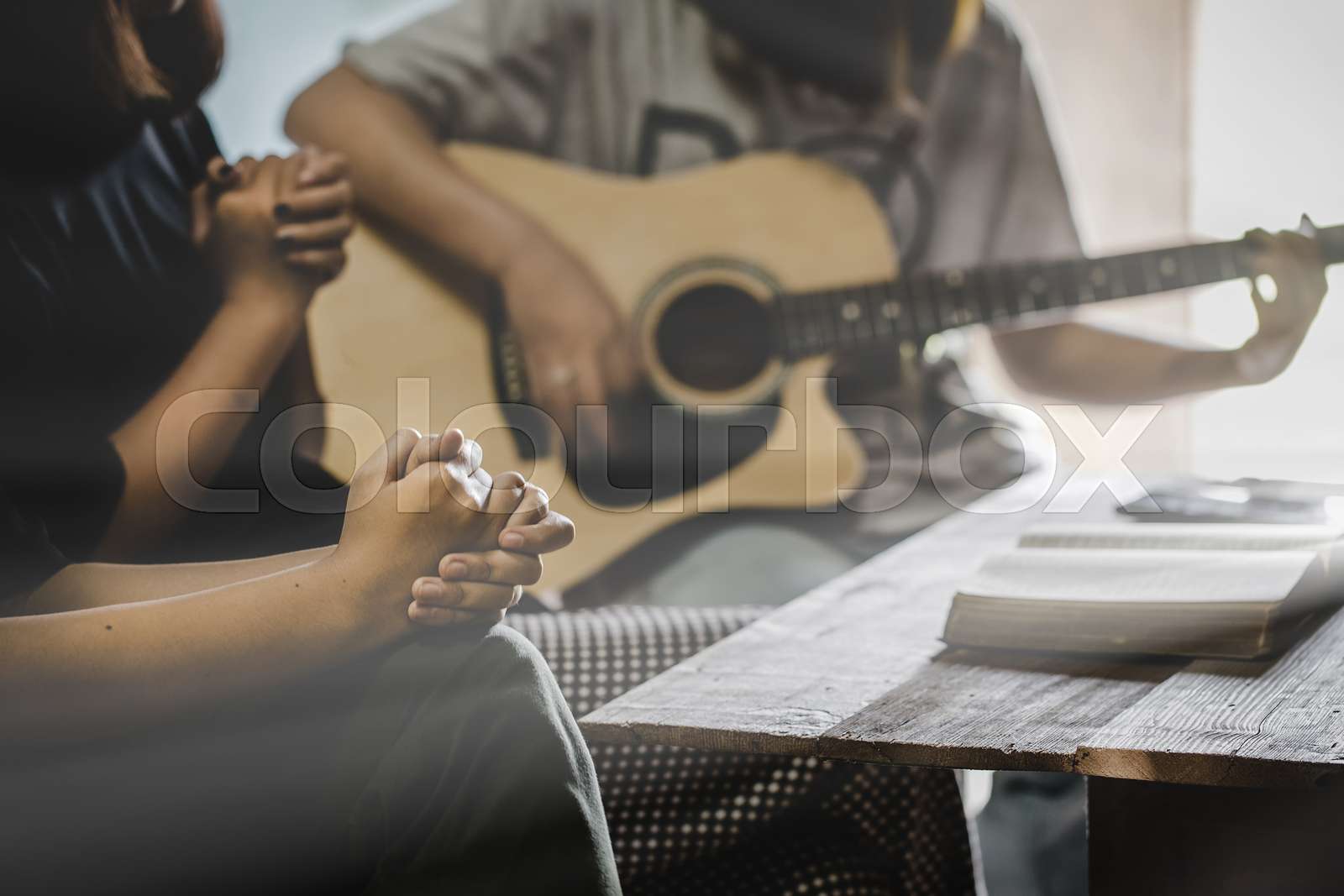 Christian family worship God in home | Stock image | Colourbox