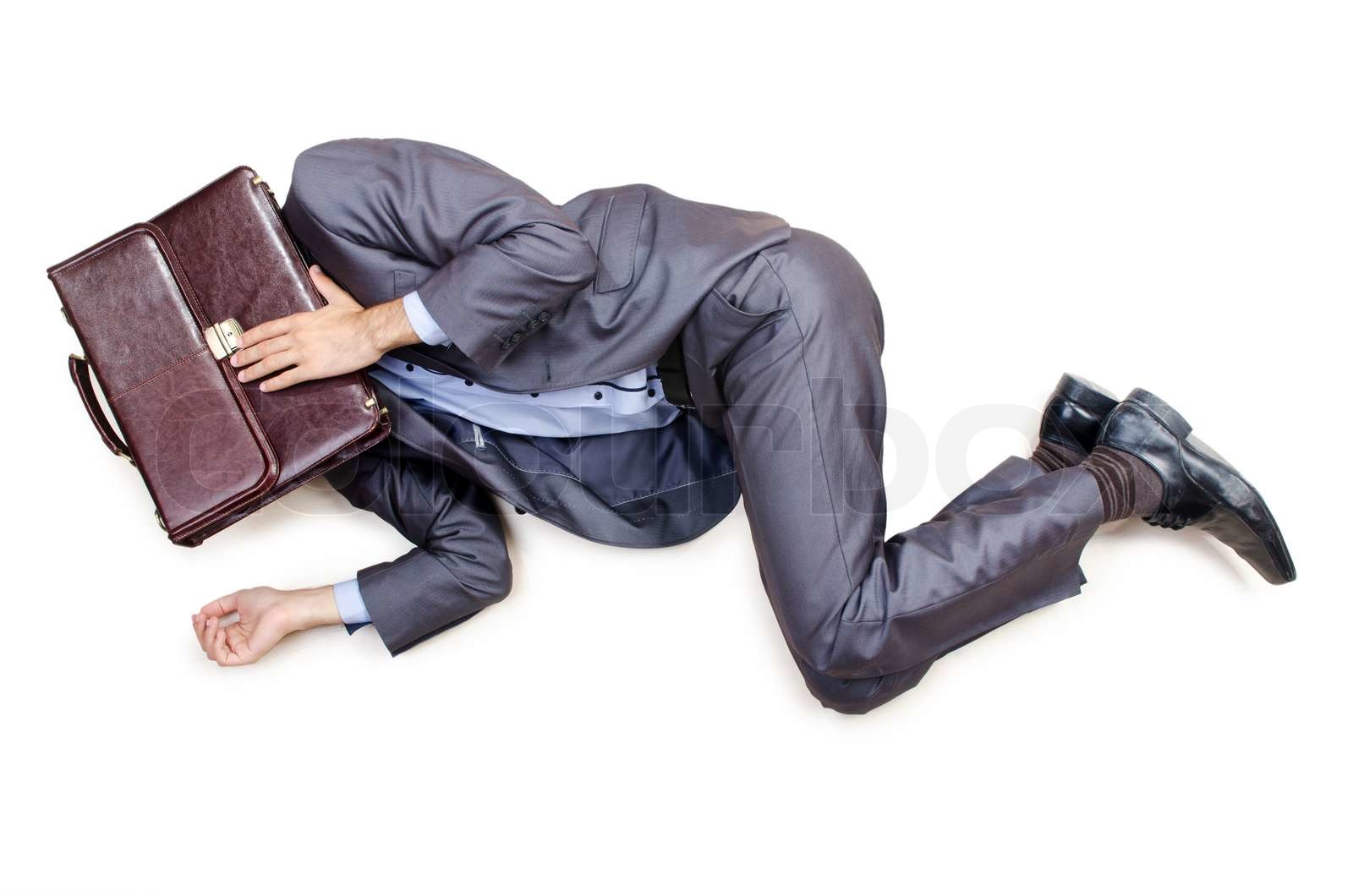 Dead businessman on the floor | Stock image | Colourbox