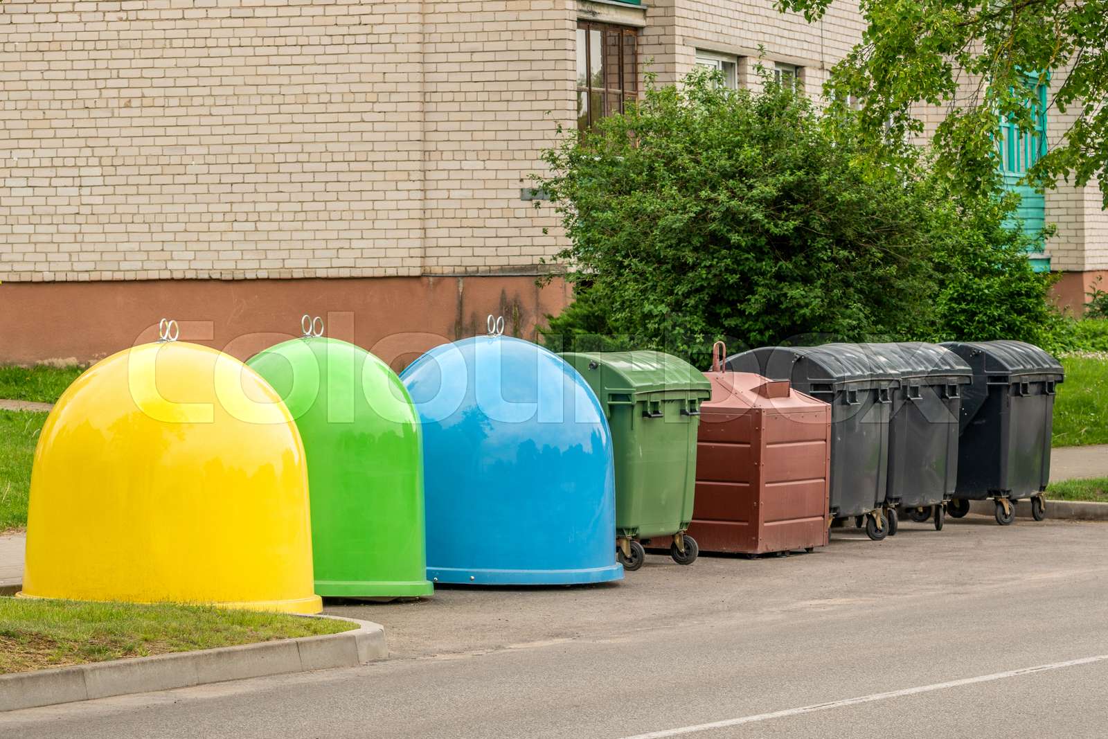 The different garbage bins on the street | Stock image | Colourbox