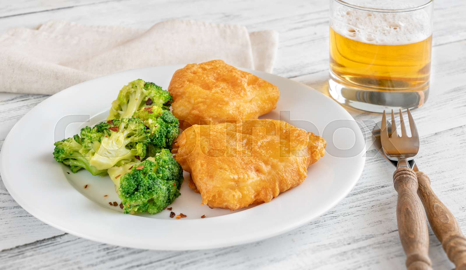 Battered fish with broccoli | Stock image | Colourbox