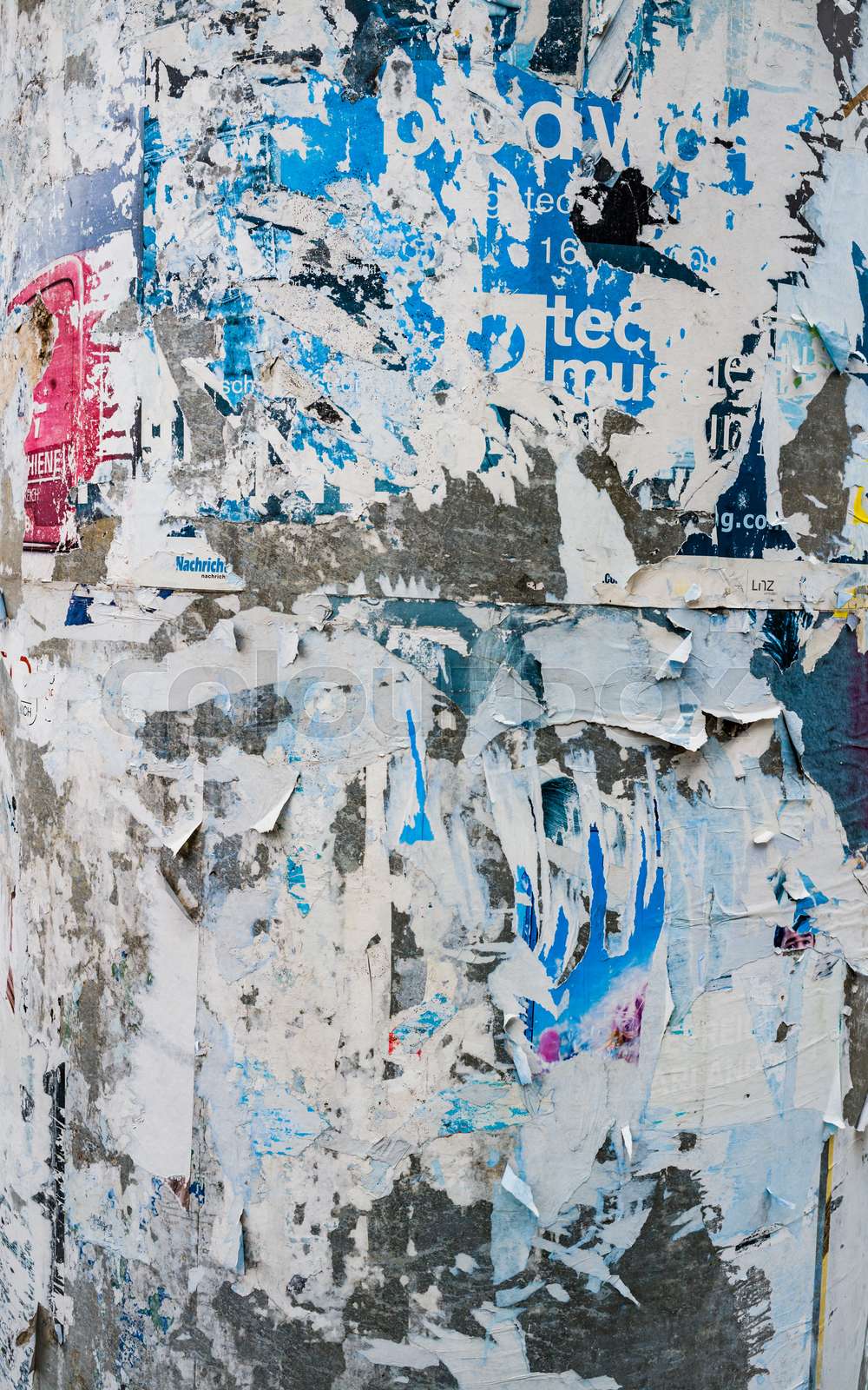 advertising column. scratched off posters. waiting for new infor ...