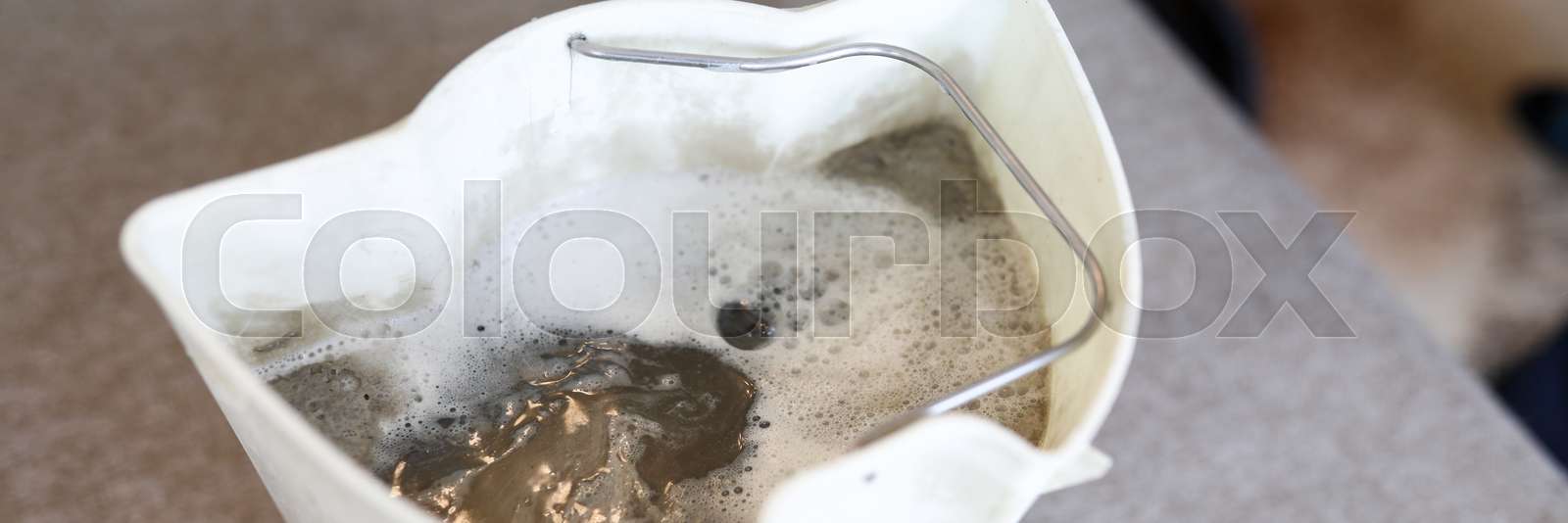 Bucket with dirty water, cleaning home service | Stock image | Colourbox