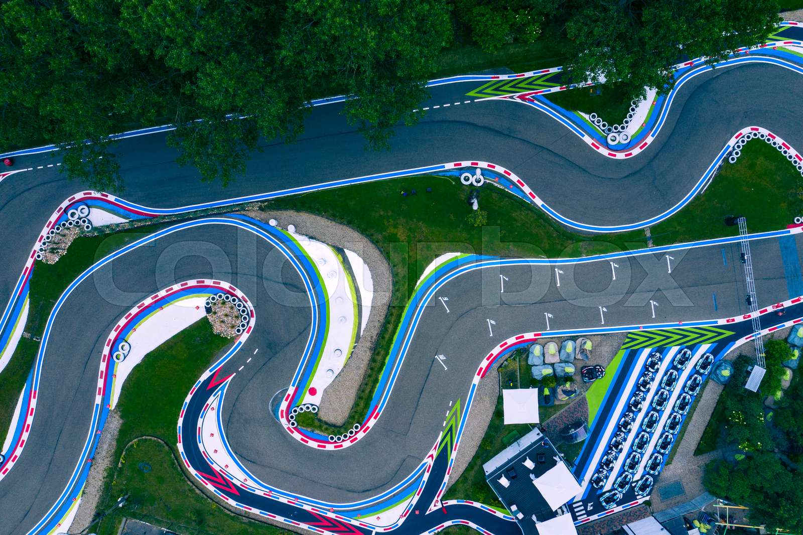 Aerial drone view of a kart racing in the forest, view from above ...