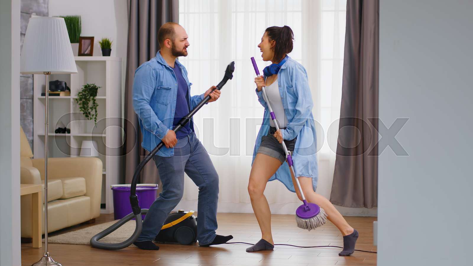 Having fun doing housekeeping | Stock image | Colourbox