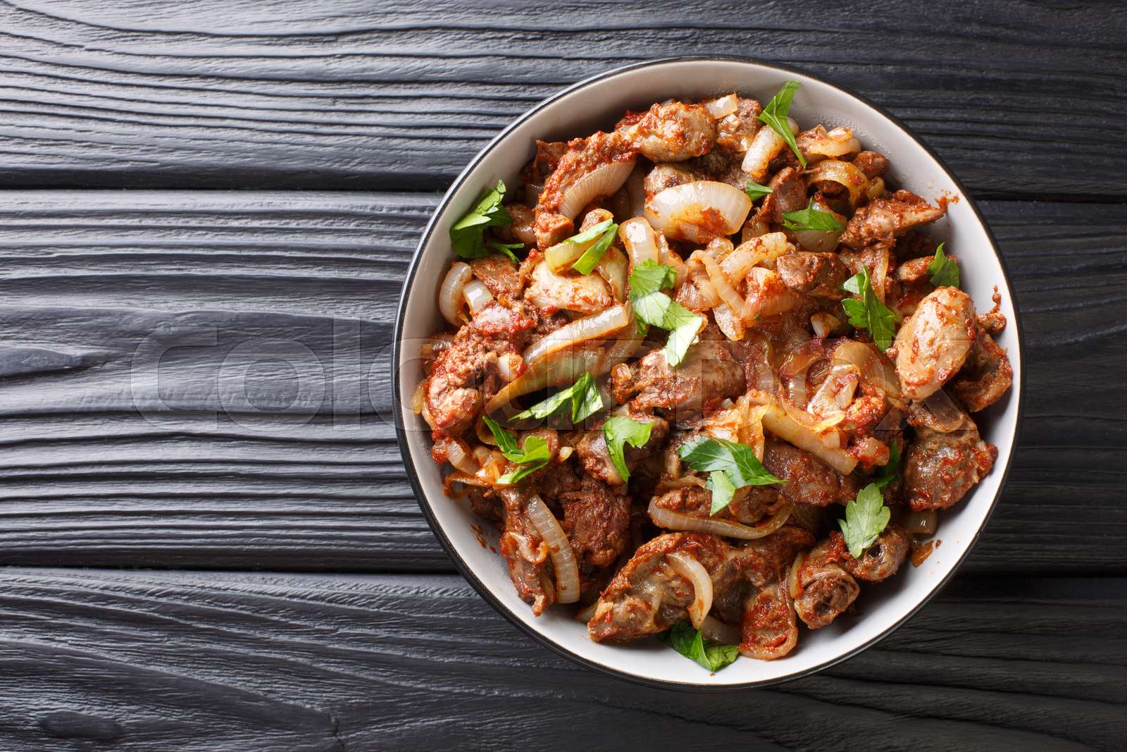 Armenian Tjvjik fried chicken offal liver, heart and stomachs with ...