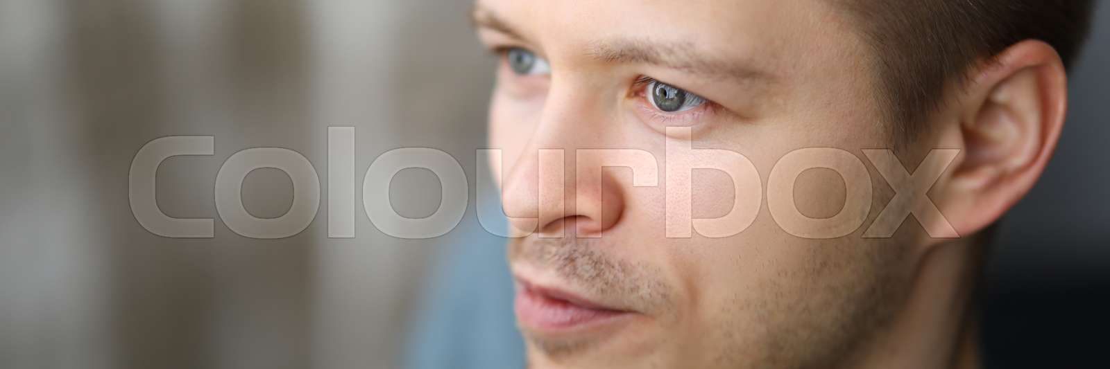 Close-up portrait in profile of an ordinary guy | Stock image | Colourbox