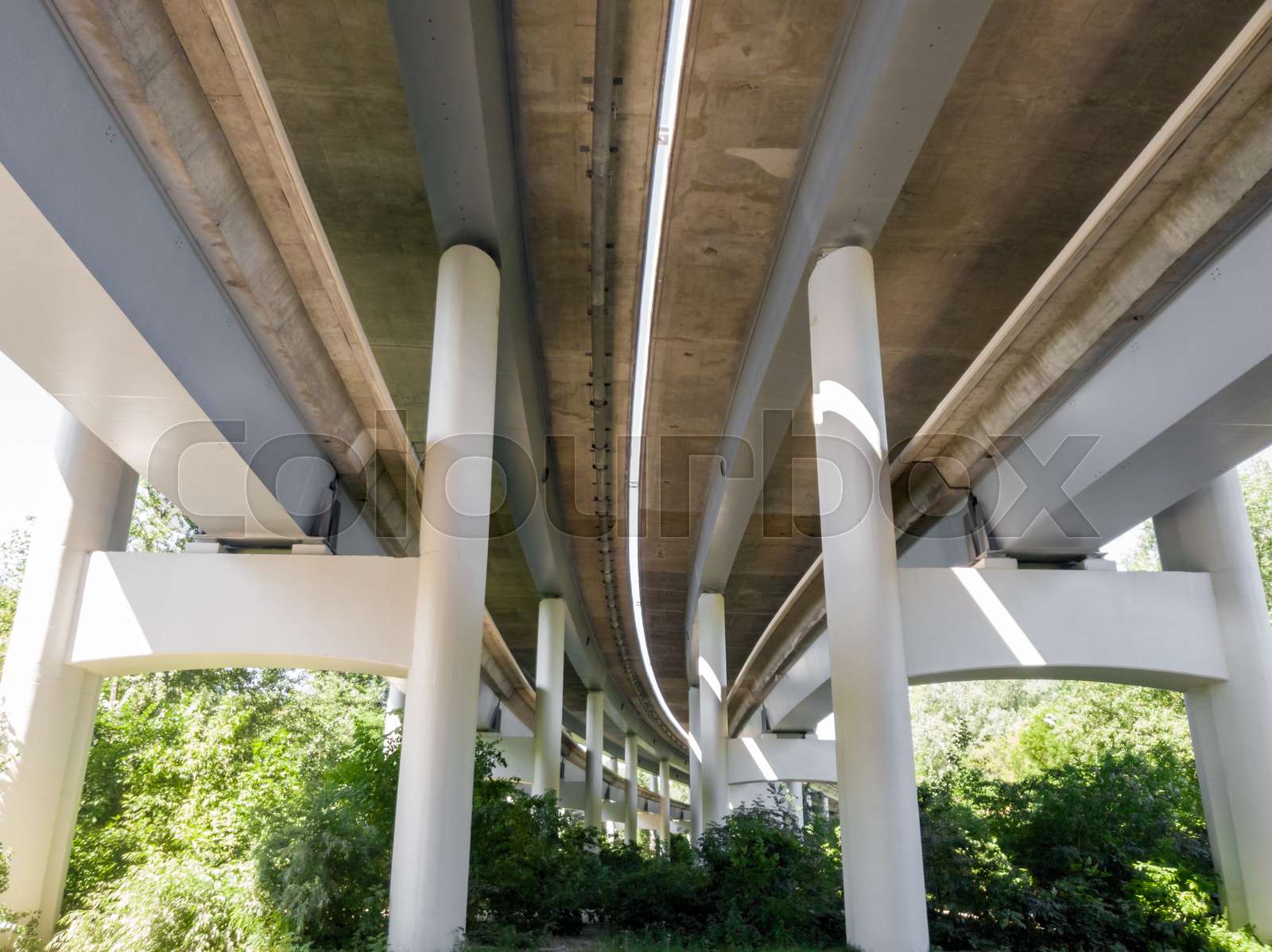 Beautiful image of concrete columns supporting elevated highway road ...