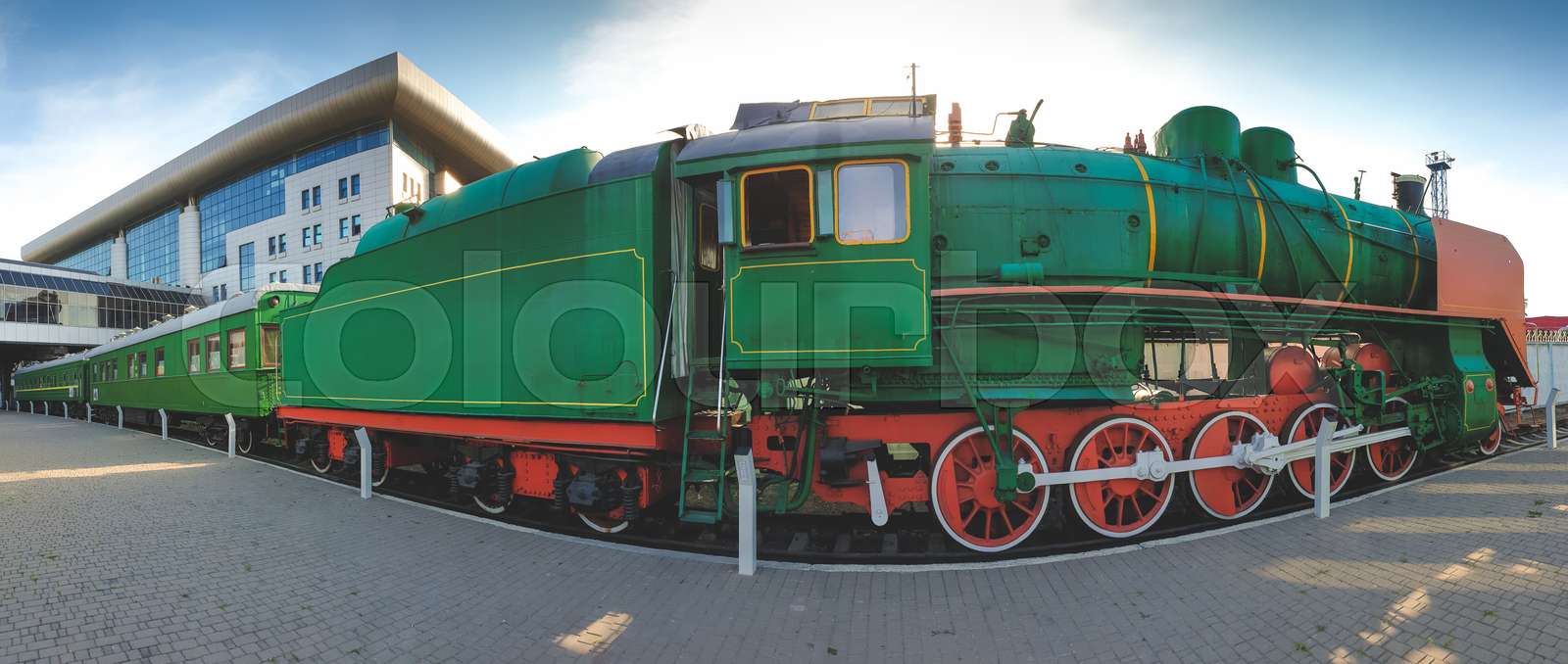 Toned panoramic image of vintage steam locomotive at railroad station ...