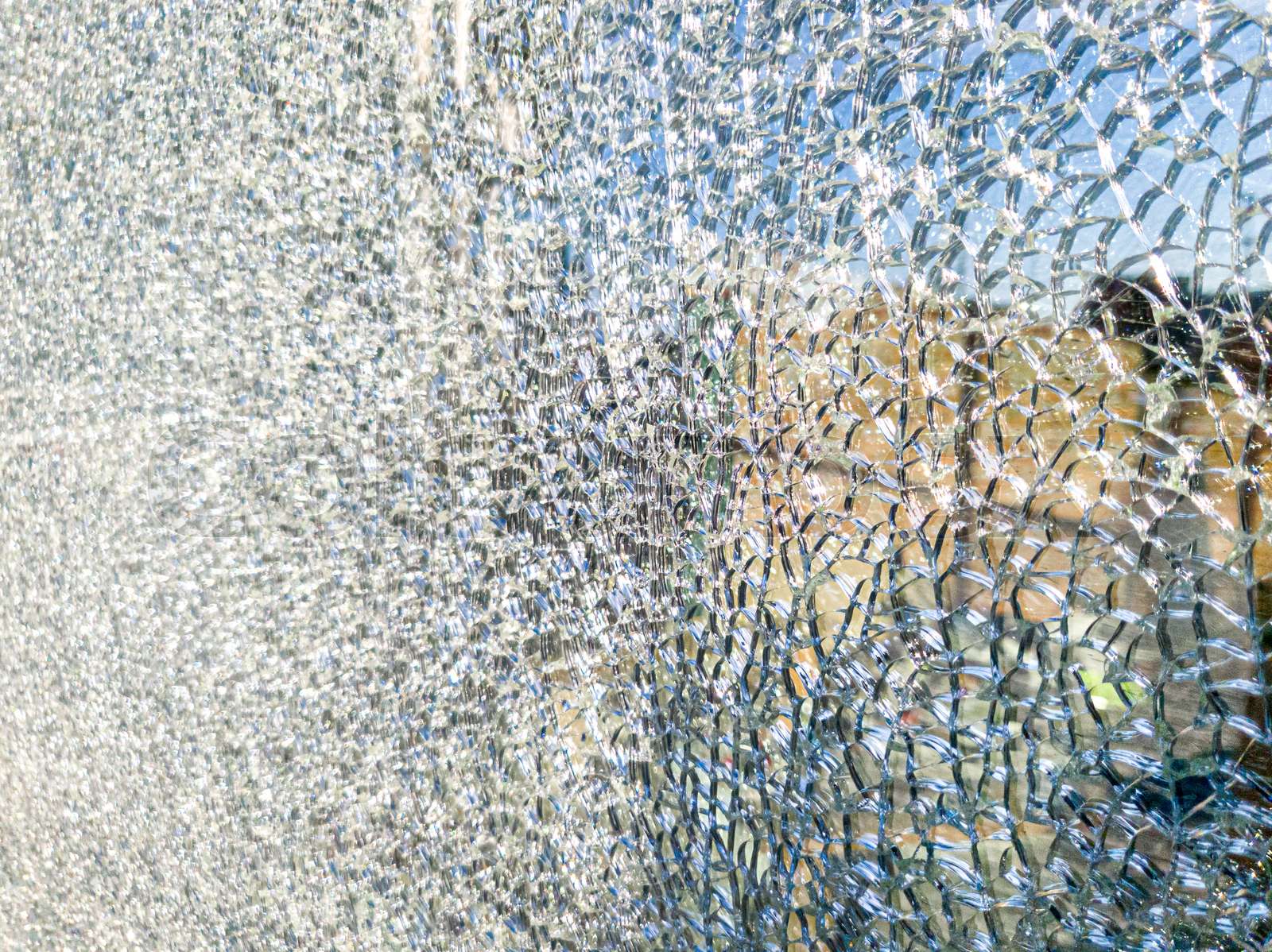 Closeup texture of shattered mirror or glass in lots of small pieces ...