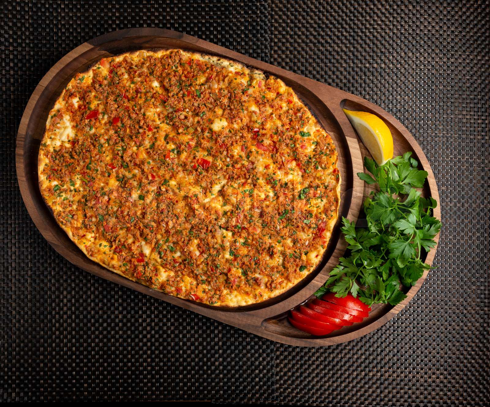 turkish lahmajun with stuffed meat with lemon and herbs | Stock image ...