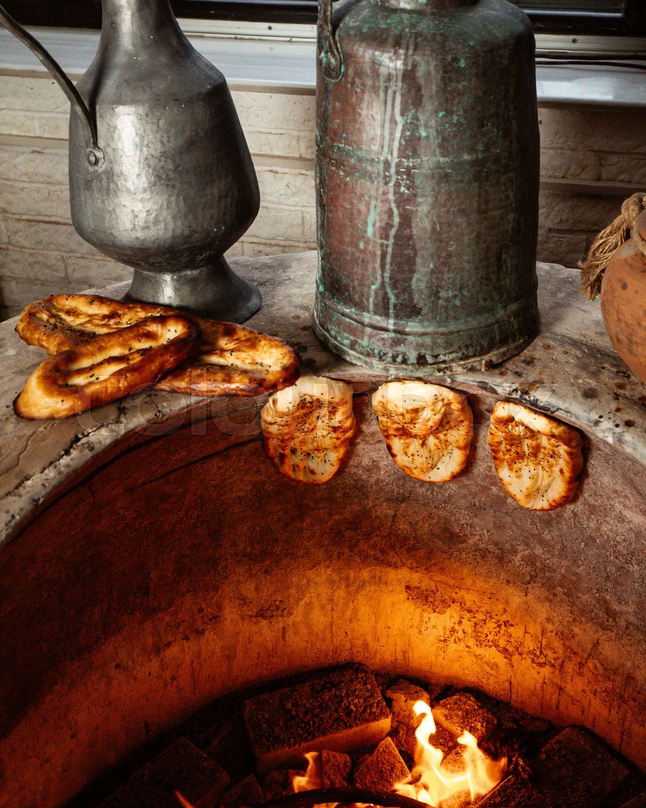 tendir bread in baked in special pit | Stock image | Colourbox