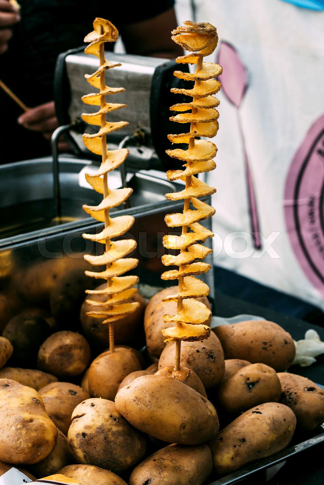 sliced fried potatoes on stick | Stock image | Colourbox