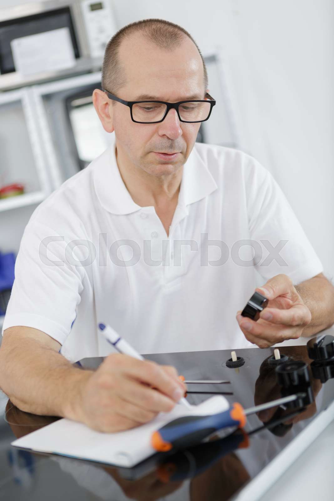 factory man worker during technological process of manufacturing ...