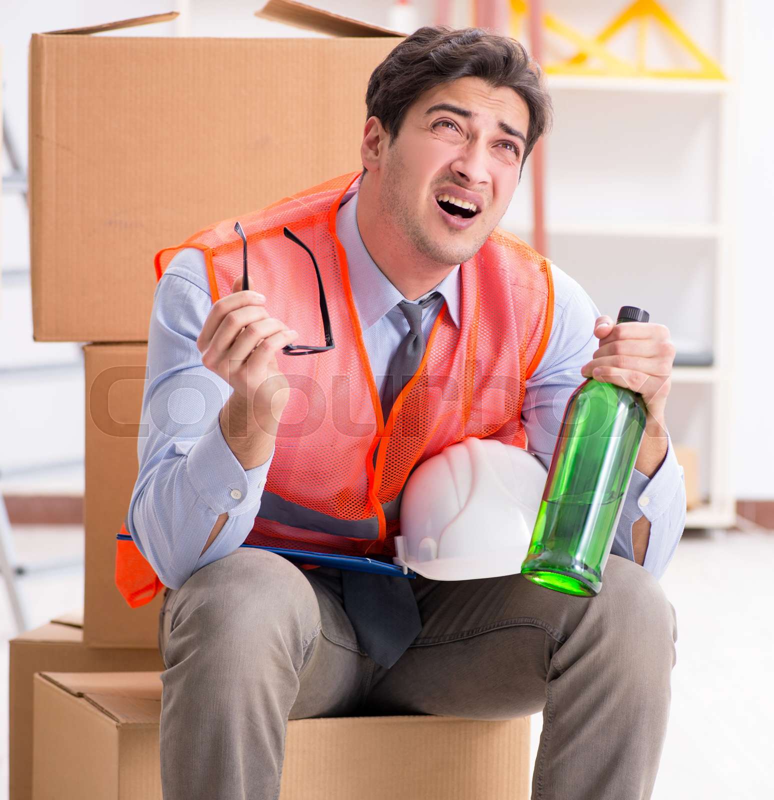 Delivery man drunk at work | Stock image | Colourbox