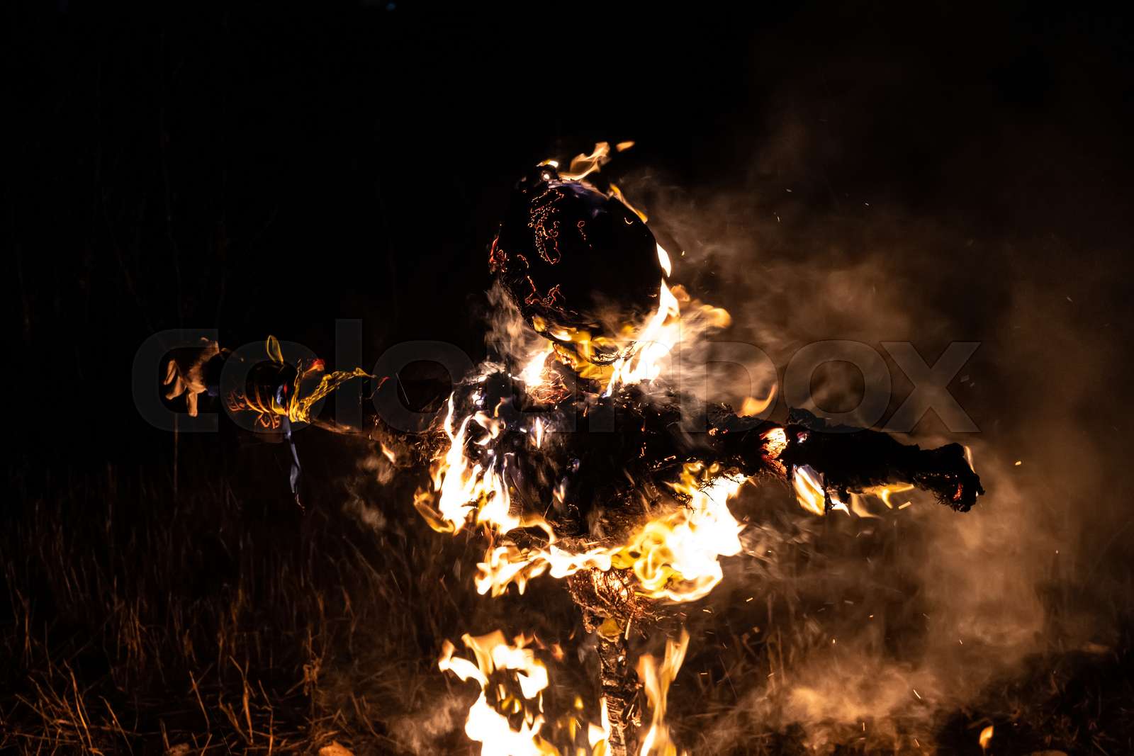 Burning scarecrow at night | Stock image | Colourbox