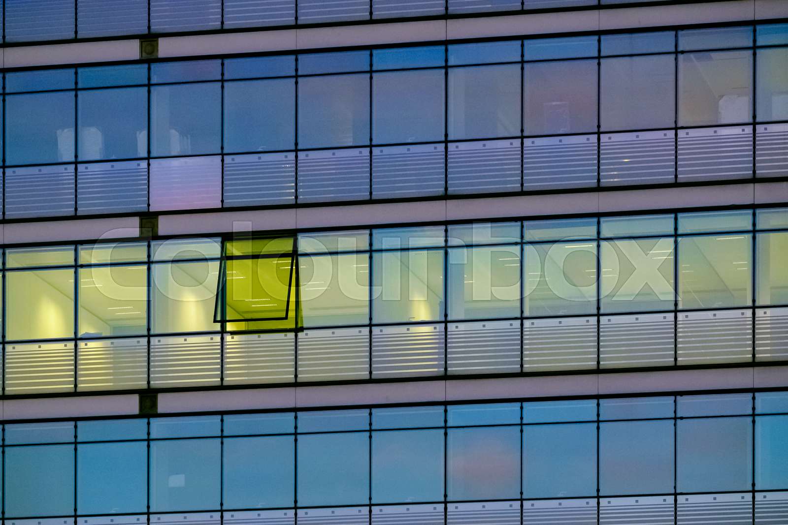 Yellow row windows on office building | Stock image | Colourbox