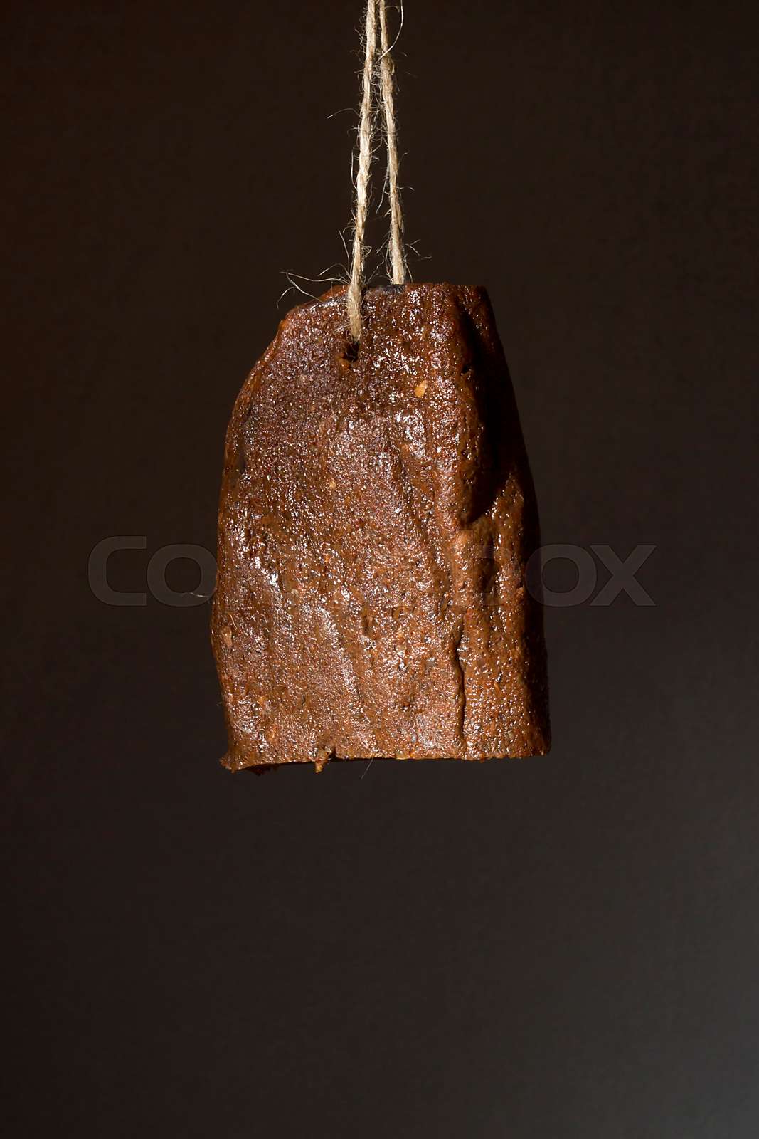 Jerky beef hanging on a rope | Stock image | Colourbox