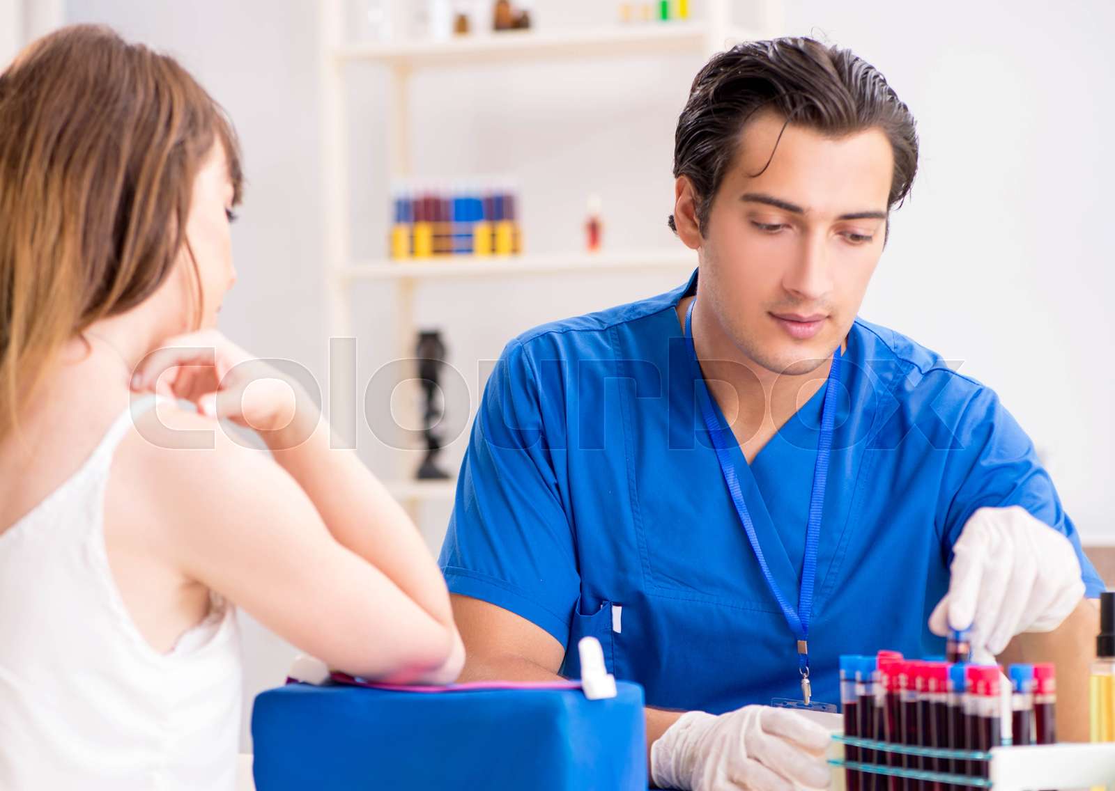 Young patient during blood test sampling procedure | Stock image ...