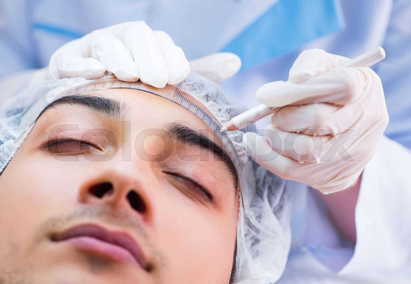 Doctor measuring patient's face before plastic surgery | Stock image ...