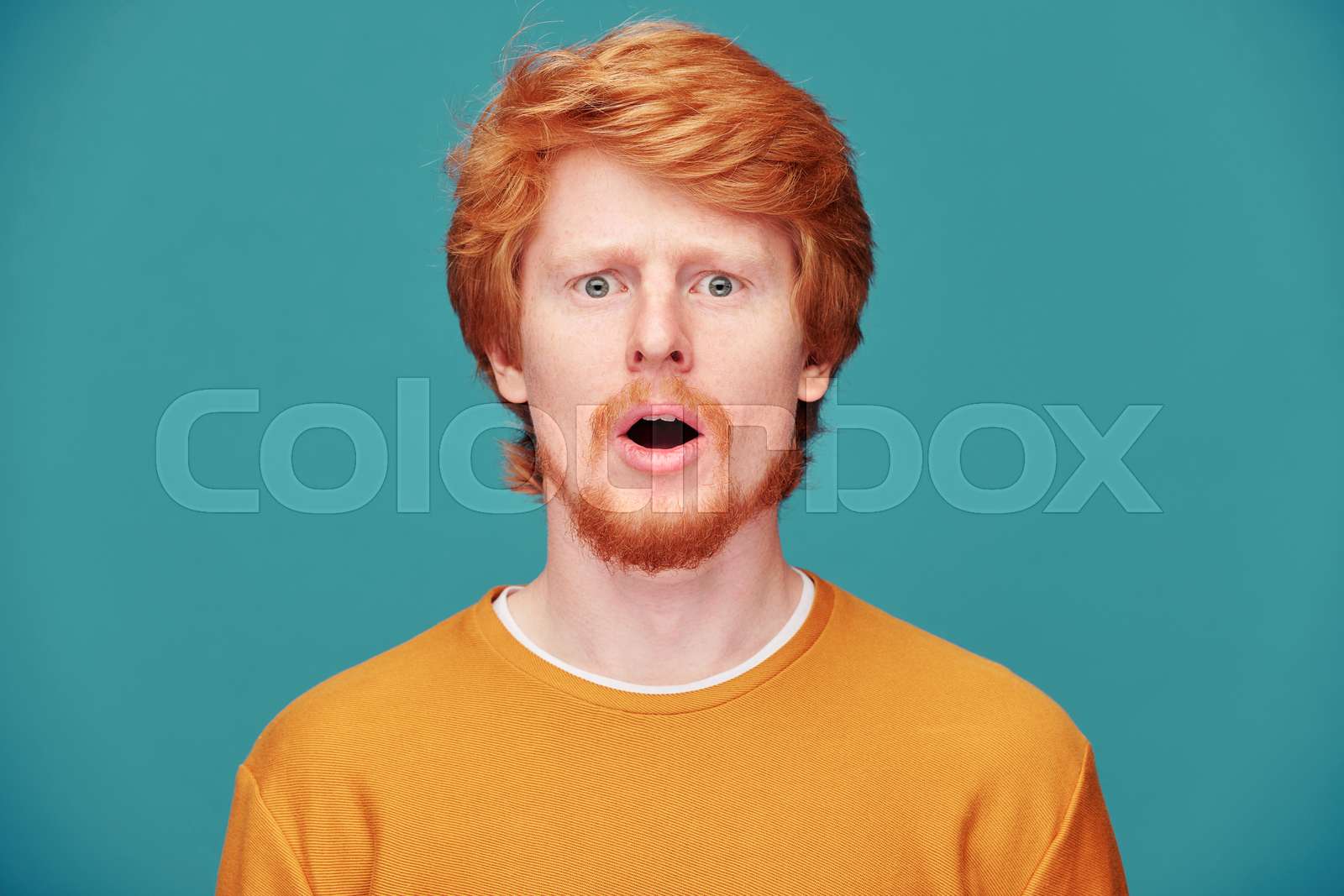 Shocked redhead guy | Stock image | Colourbox