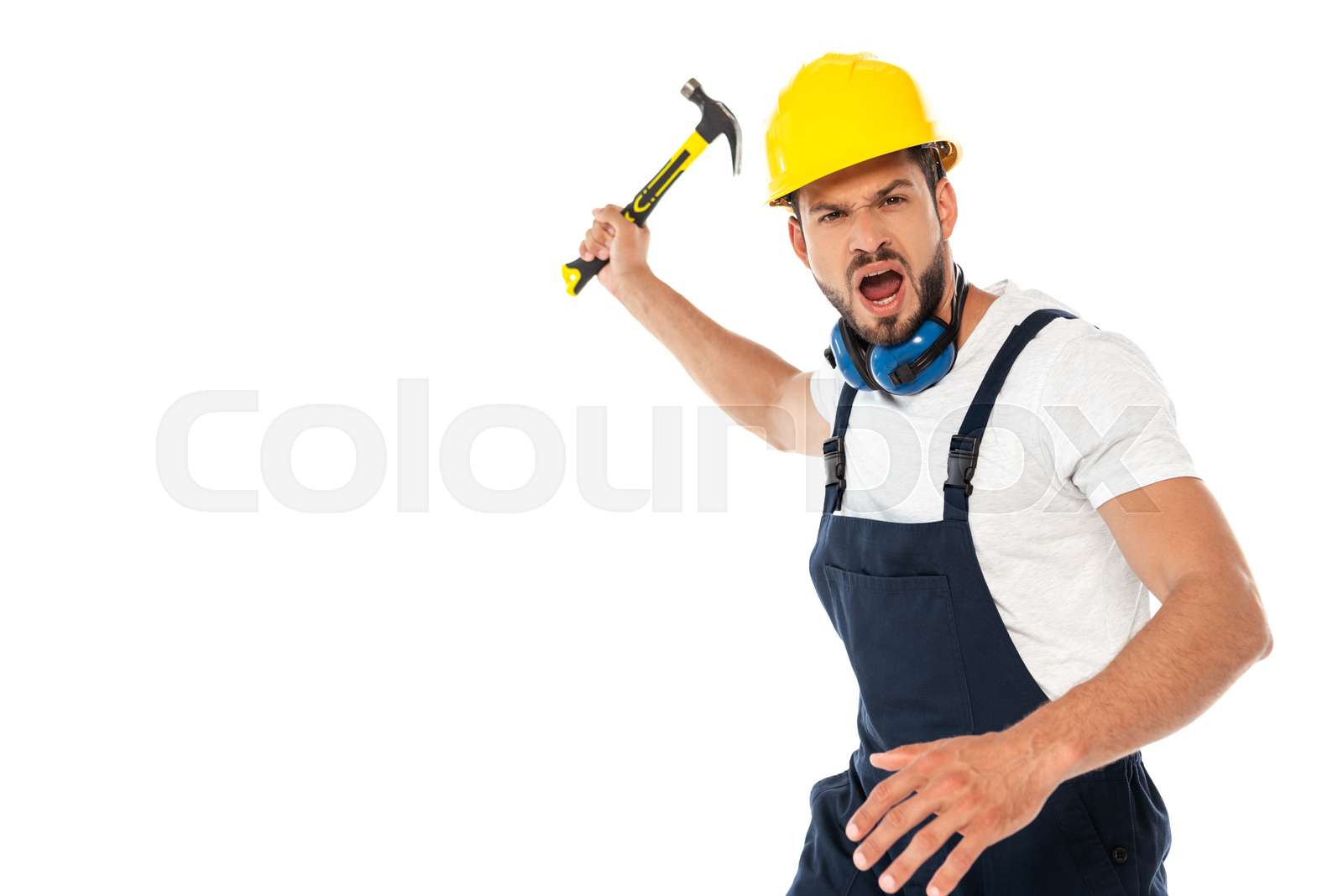 Angry workman in uniform and hardhat screaming while holding hammer isolated on white | Stock ...