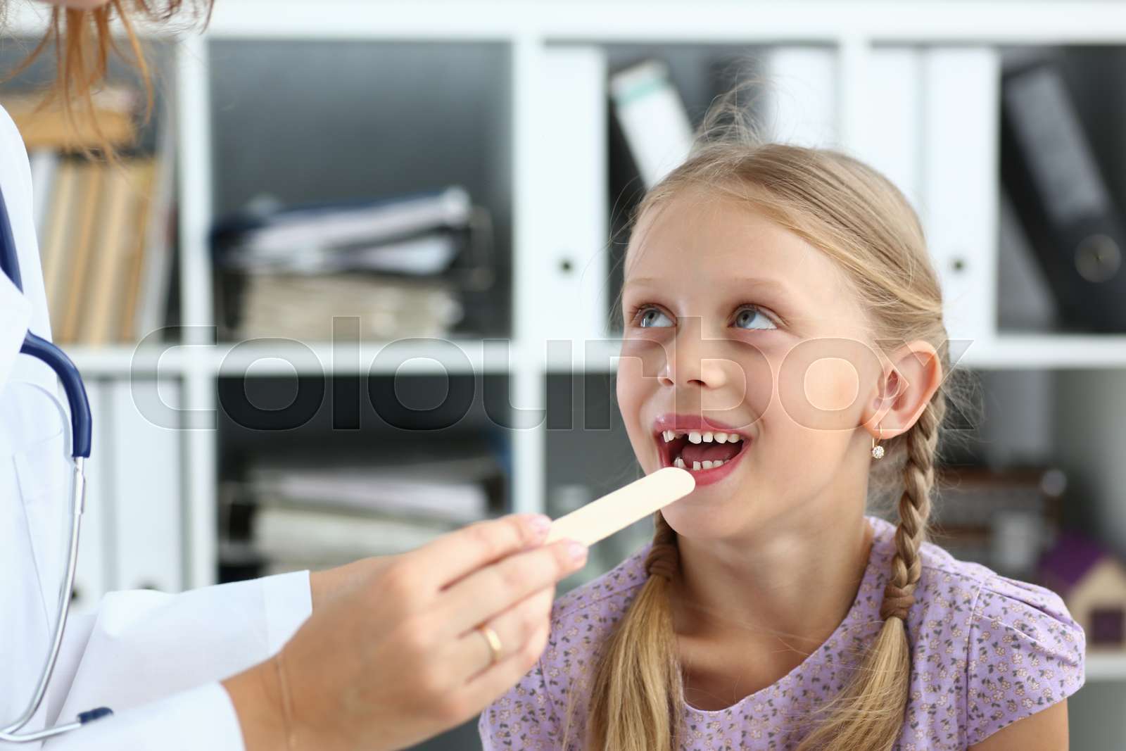 Cheerful Girl Being Examined At Female Doctor Stock Image Colourbox