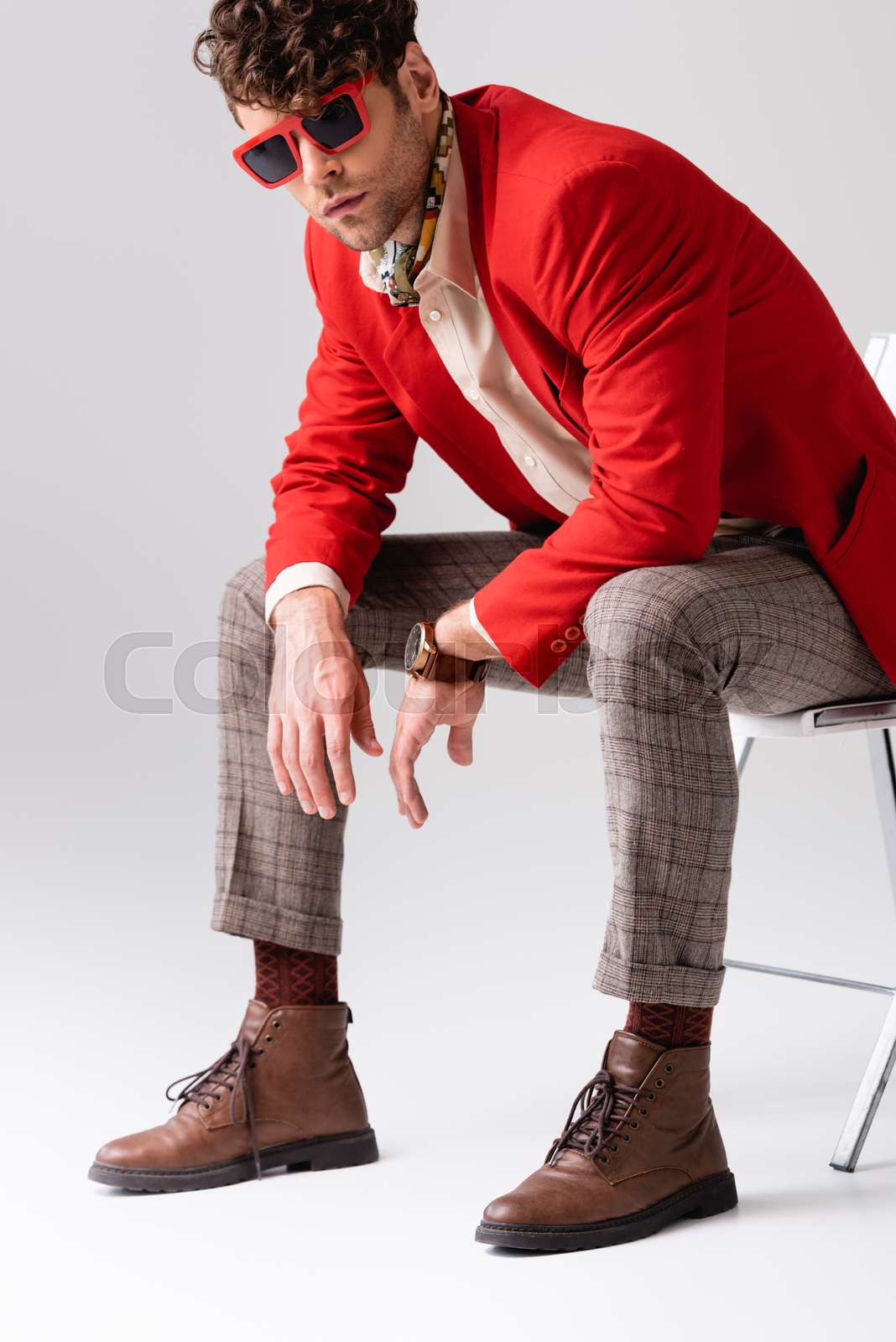 Man Sitting In Chair Profile
