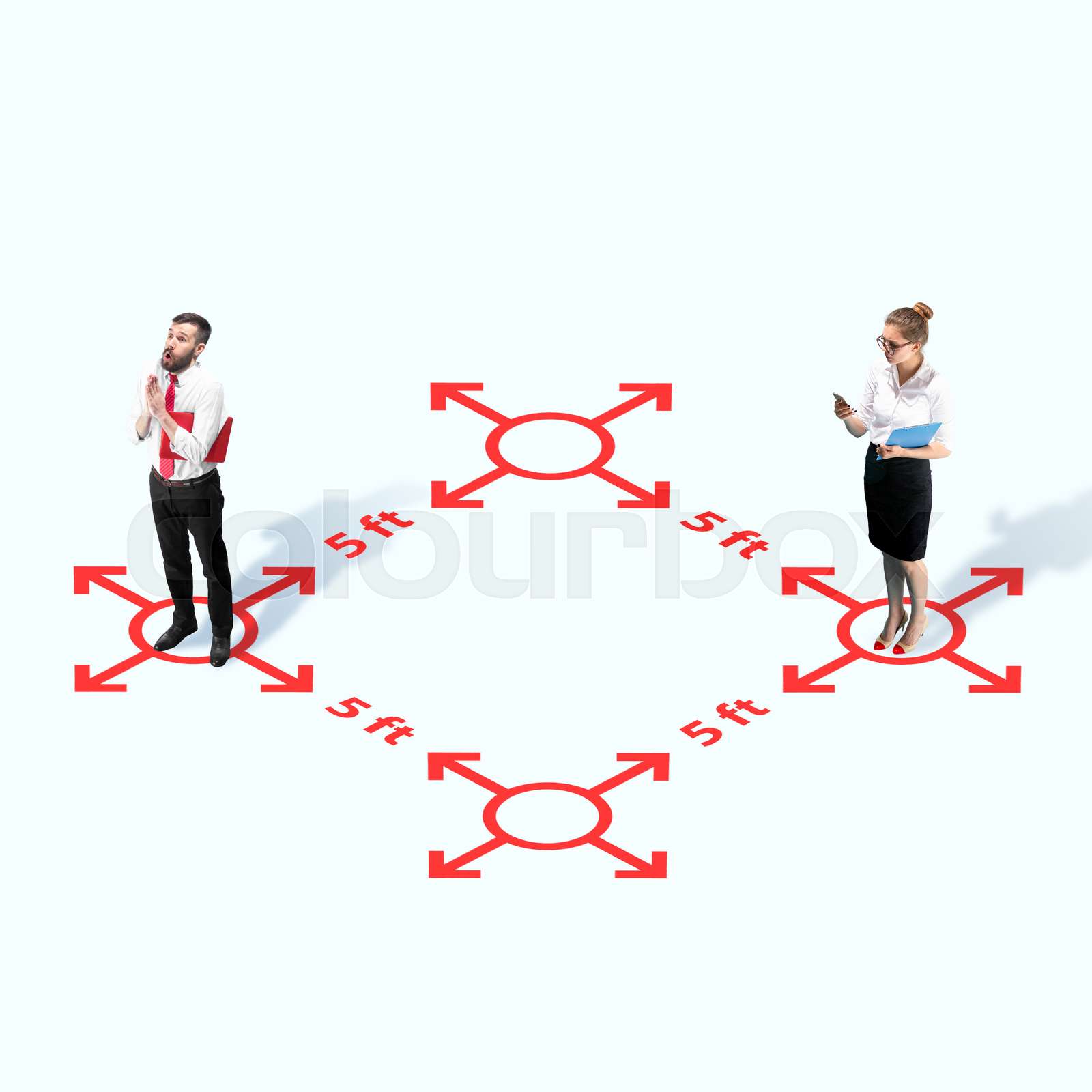 Studio shot of people demonstrating social distancing with arrows ...