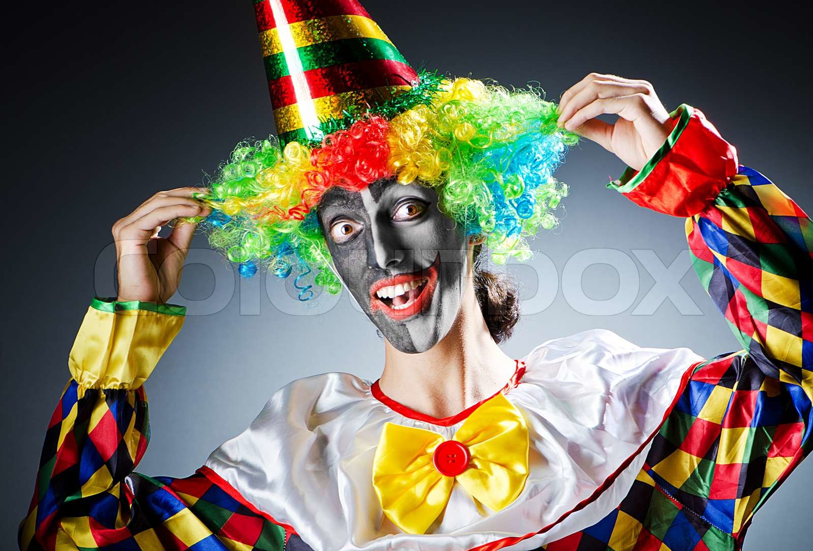 Funny clown in studio shooting | Stock image | Colourbox