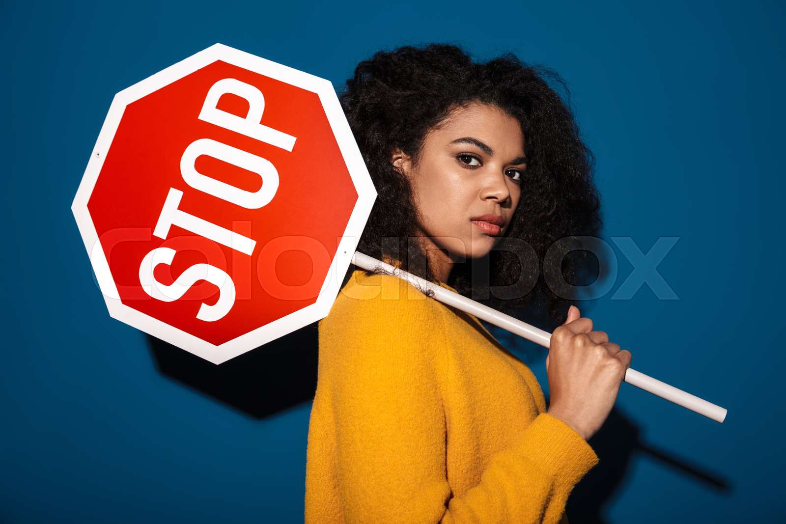 Displeased african woman holding stop symbol sign. | Stock image ...