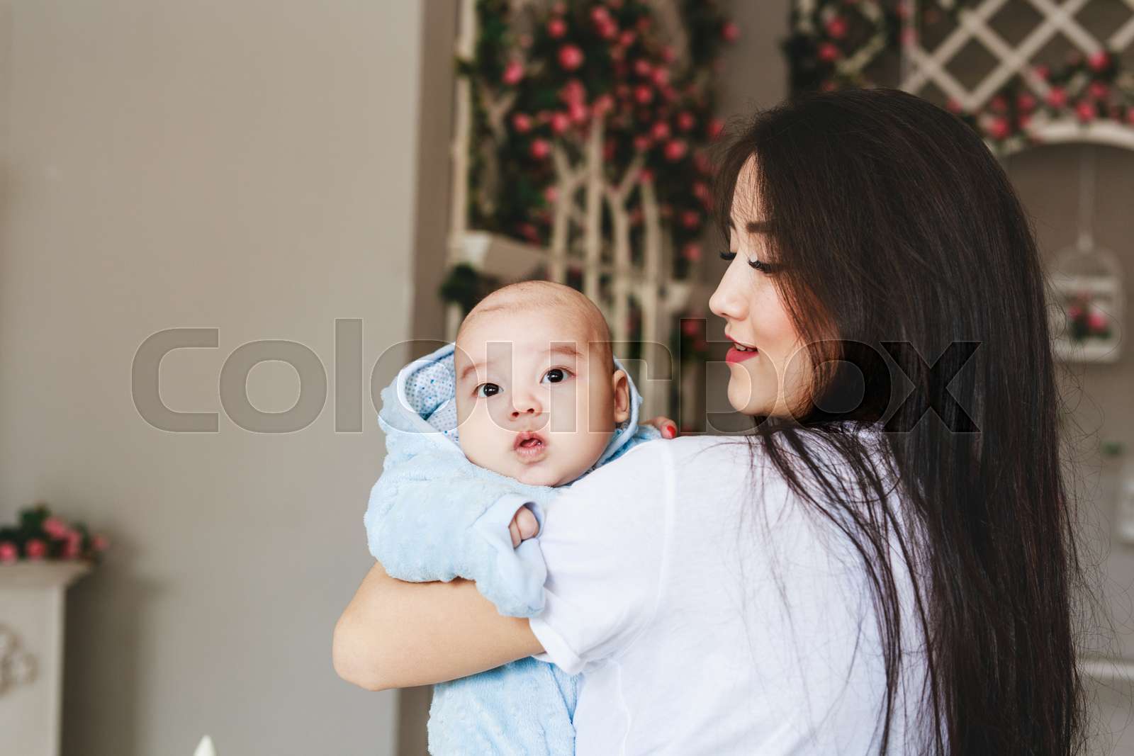 Happy Asian Mother Holding Adorable Child Baby Boy Stock Image