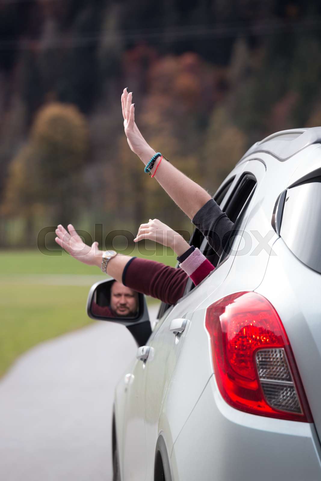 hands out of a car window | Stock image | Colourbox
