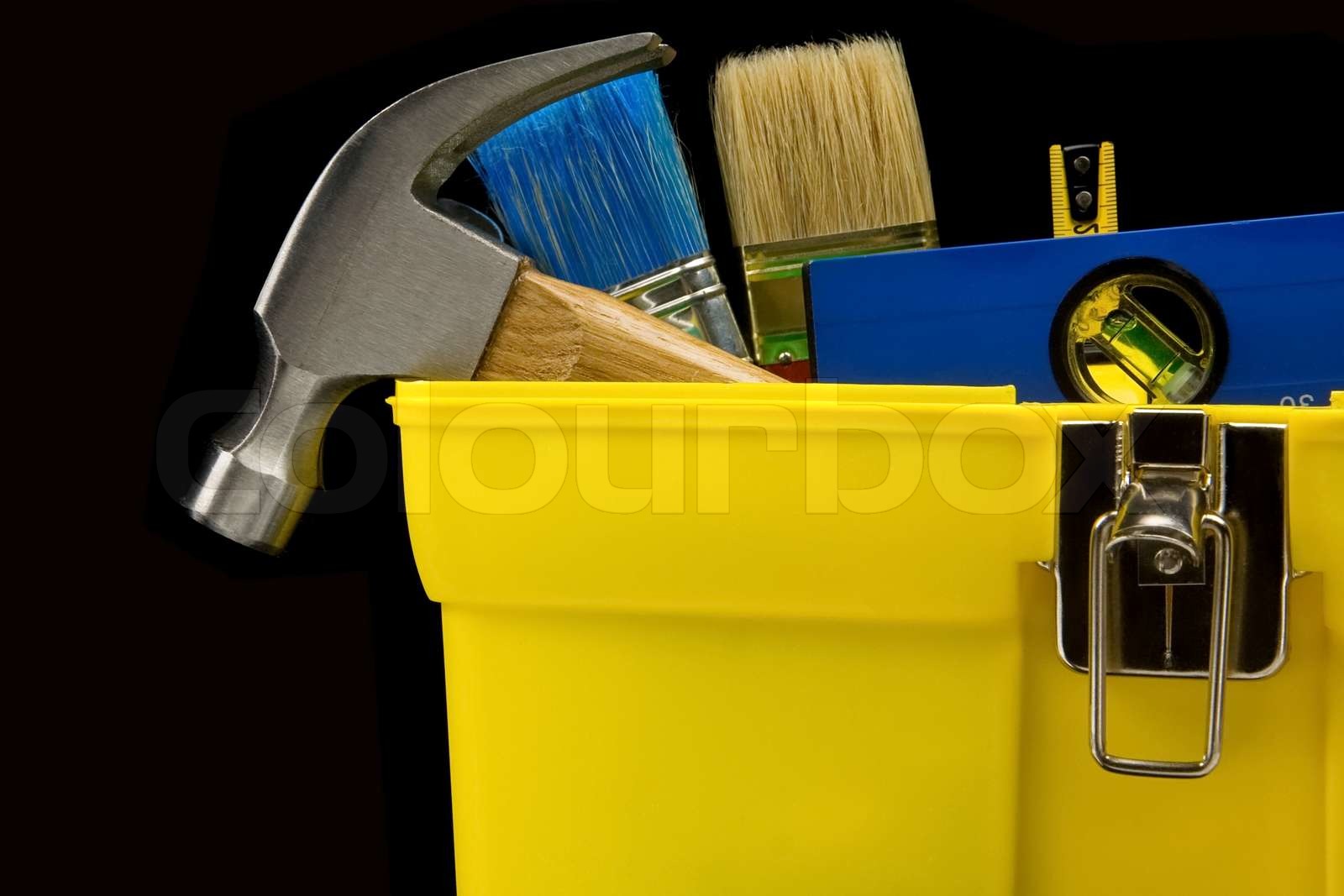 tools in construction toolbox on black | Stock image | Colourbox