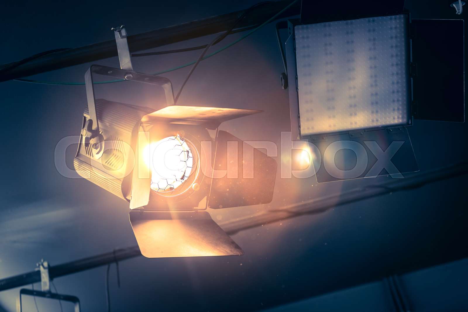 Professional orange studio spotlight in a TV studio. | Stock image ...