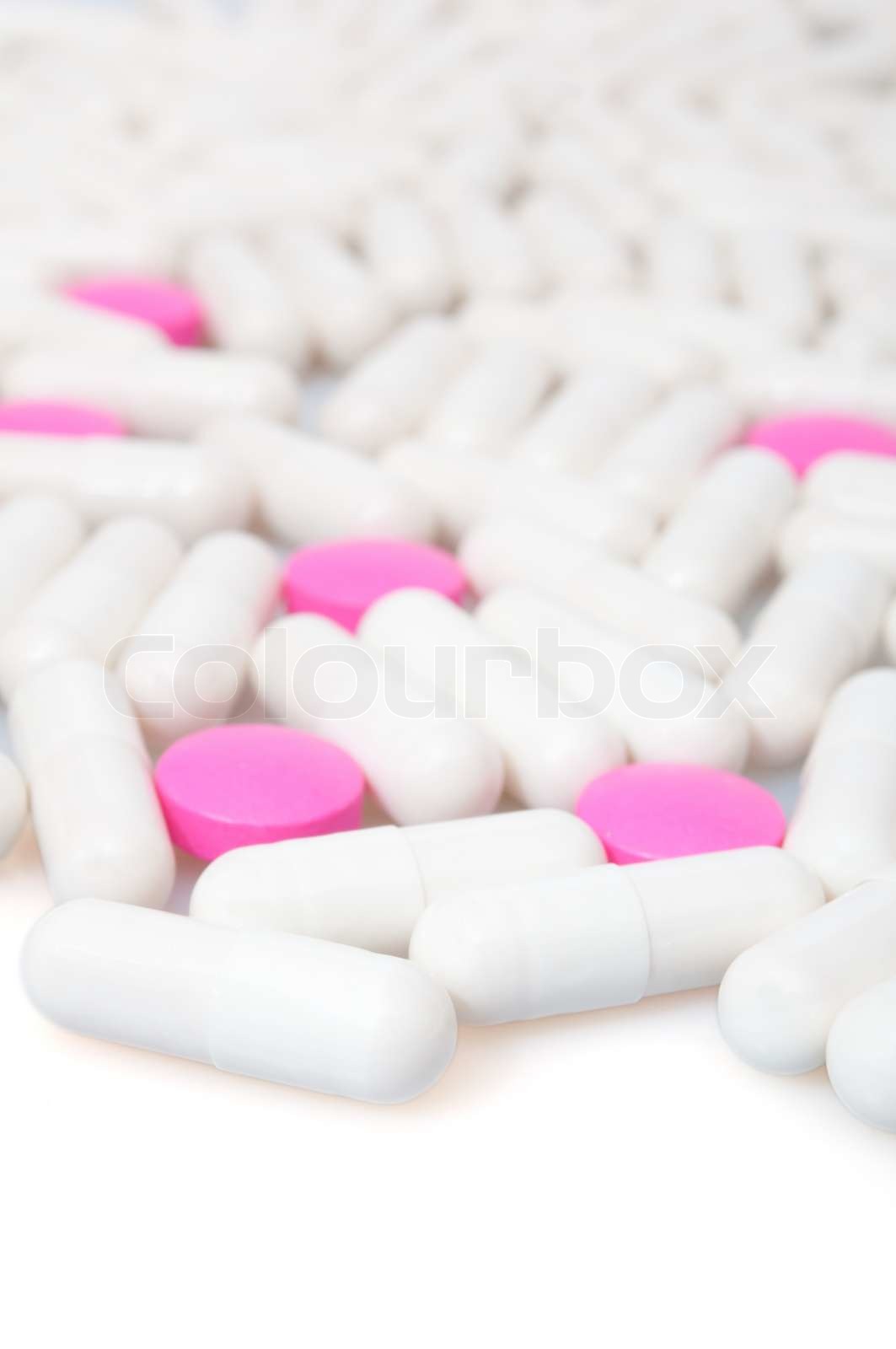 Pink Pills and White Capsule | Stock image | Colourbox