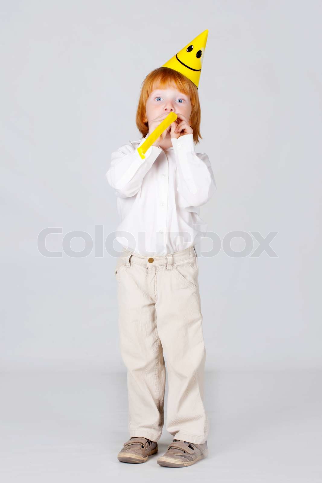 Boy with candy | Stock image | Colourbox