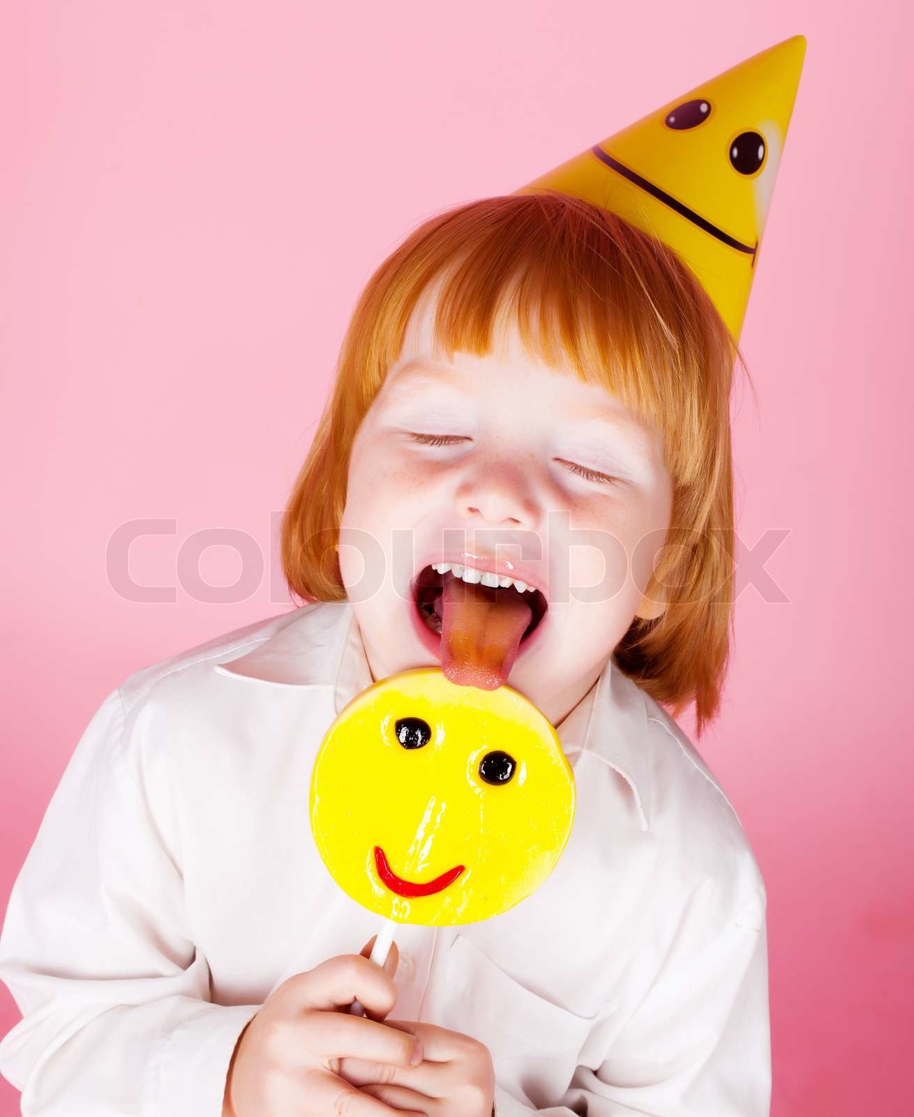 Boy with candy | Stock image | Colourbox