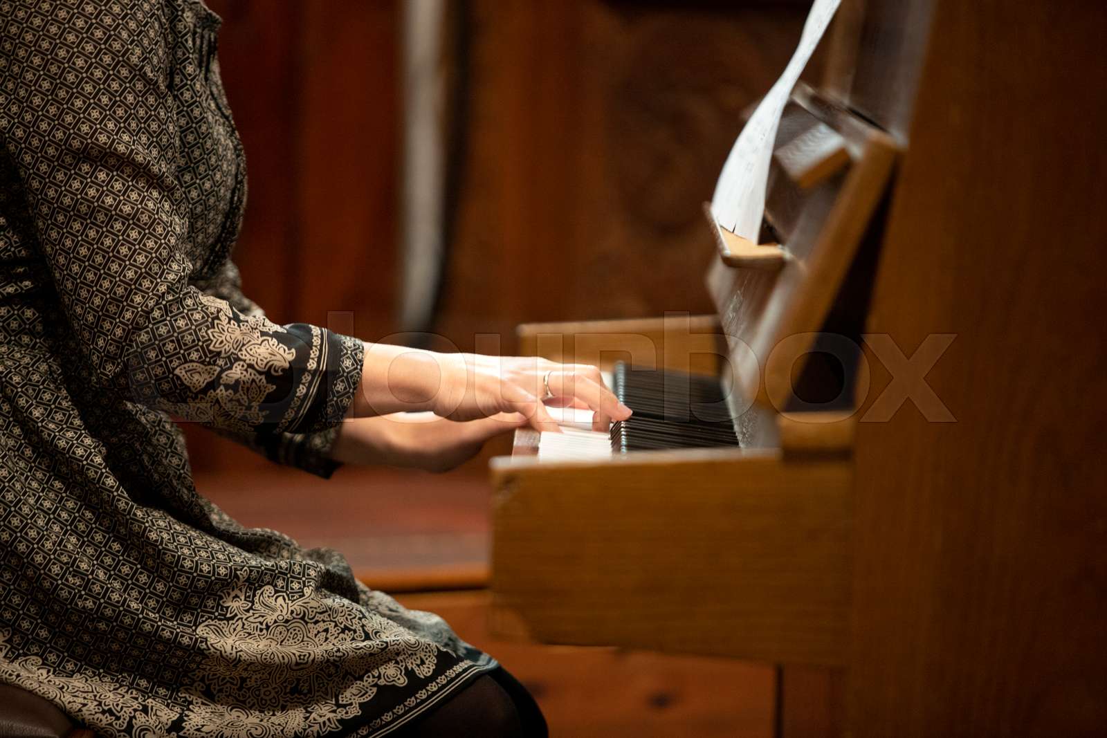 Piano Player in the Church | Stock image | Colourbox