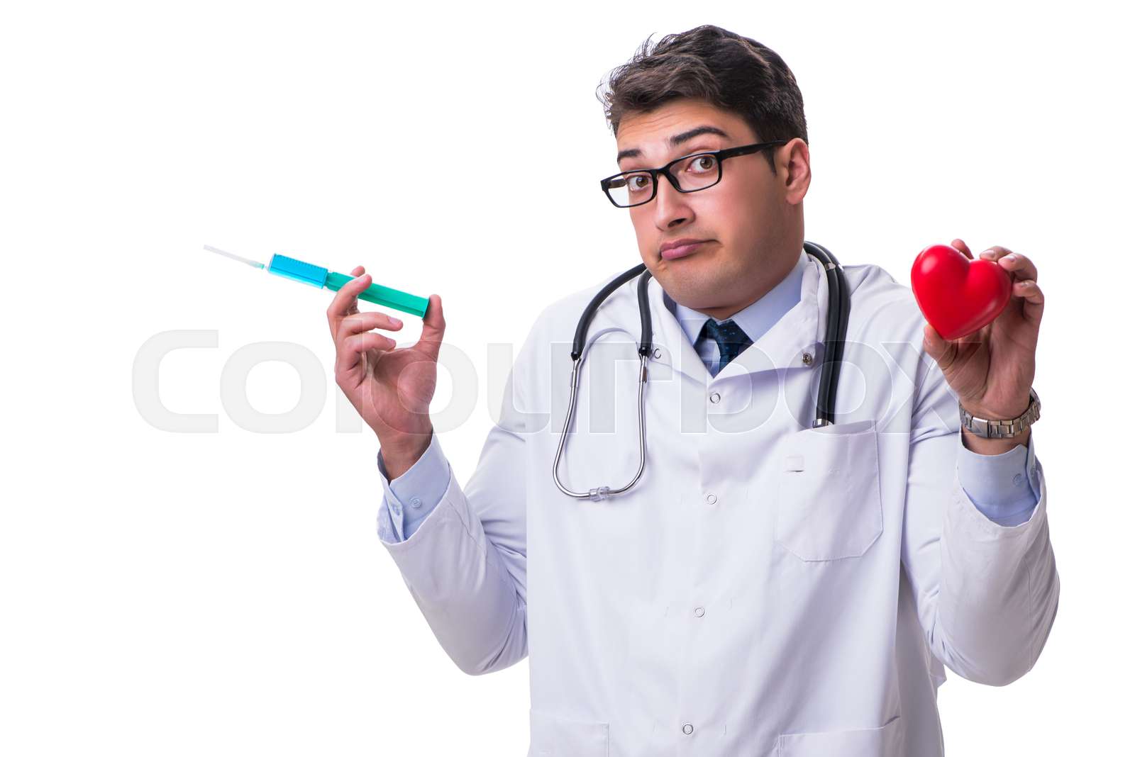 Young male cardiologist doctor holding a heart isolated on white ...