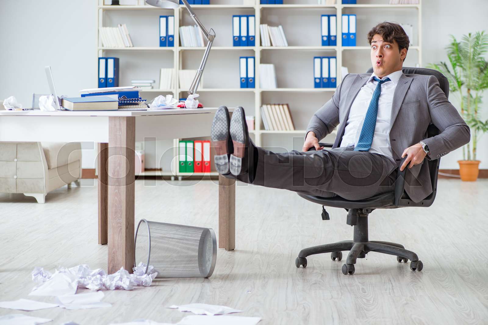 Businessman having fun taking a break in the office at work | Stock ...