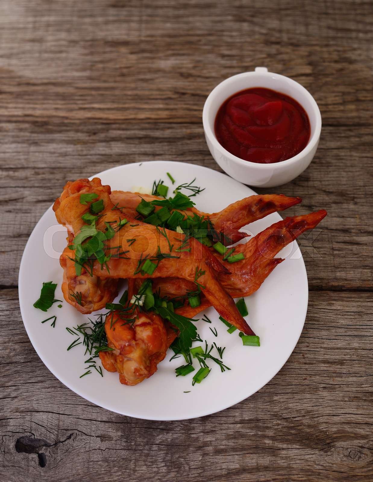 Plate of fried chicken wings. | Stock image | Colourbox