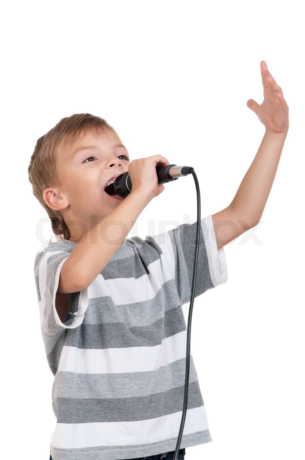 Boy with microphone | Stock image | Colourbox