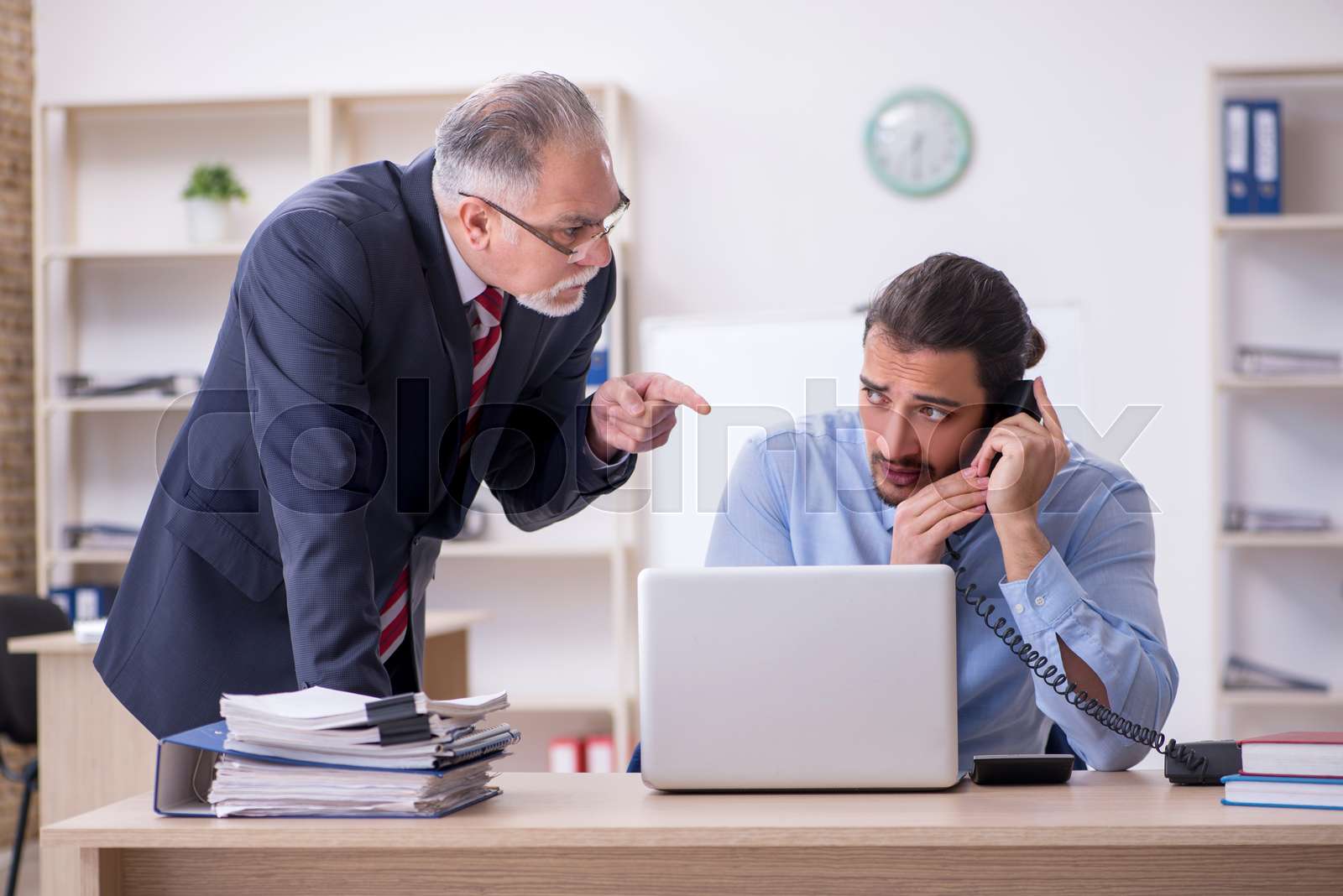 Two employees in the office | Stock image | Colourbox