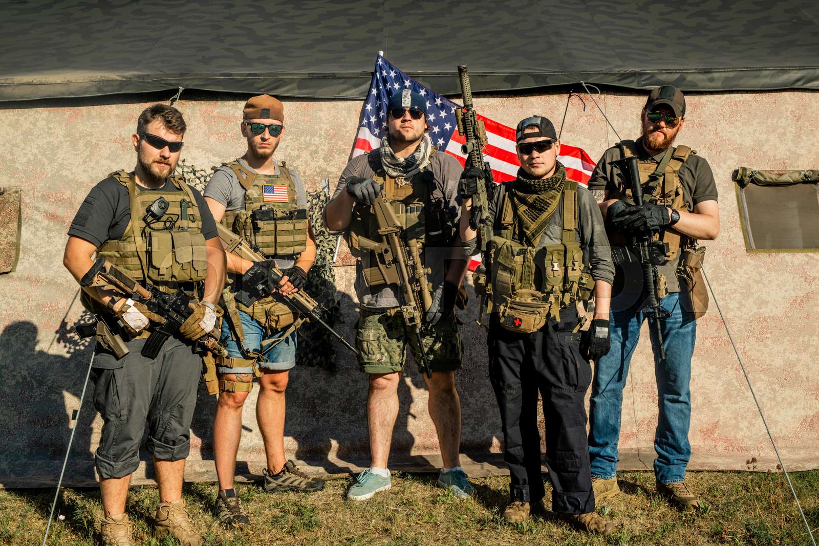 Group of men with weapons | Stock image | Colourbox