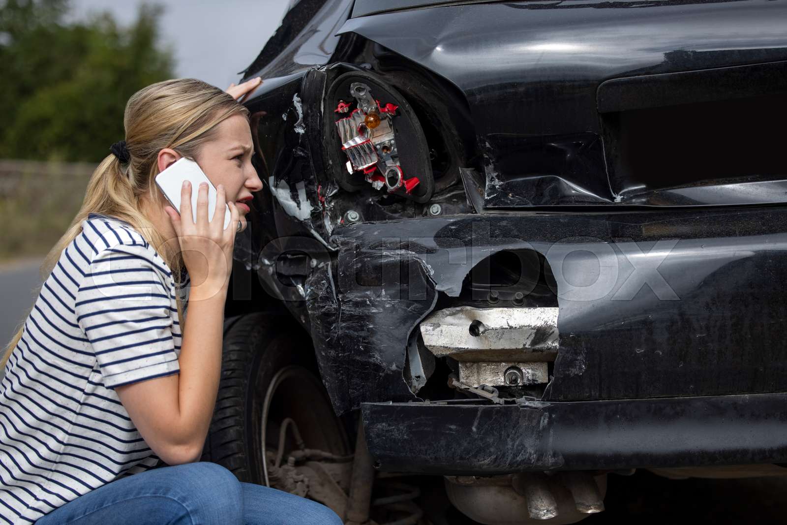 Unhappy Female Driver With Damaged Car After Accident Calling Insurance ...