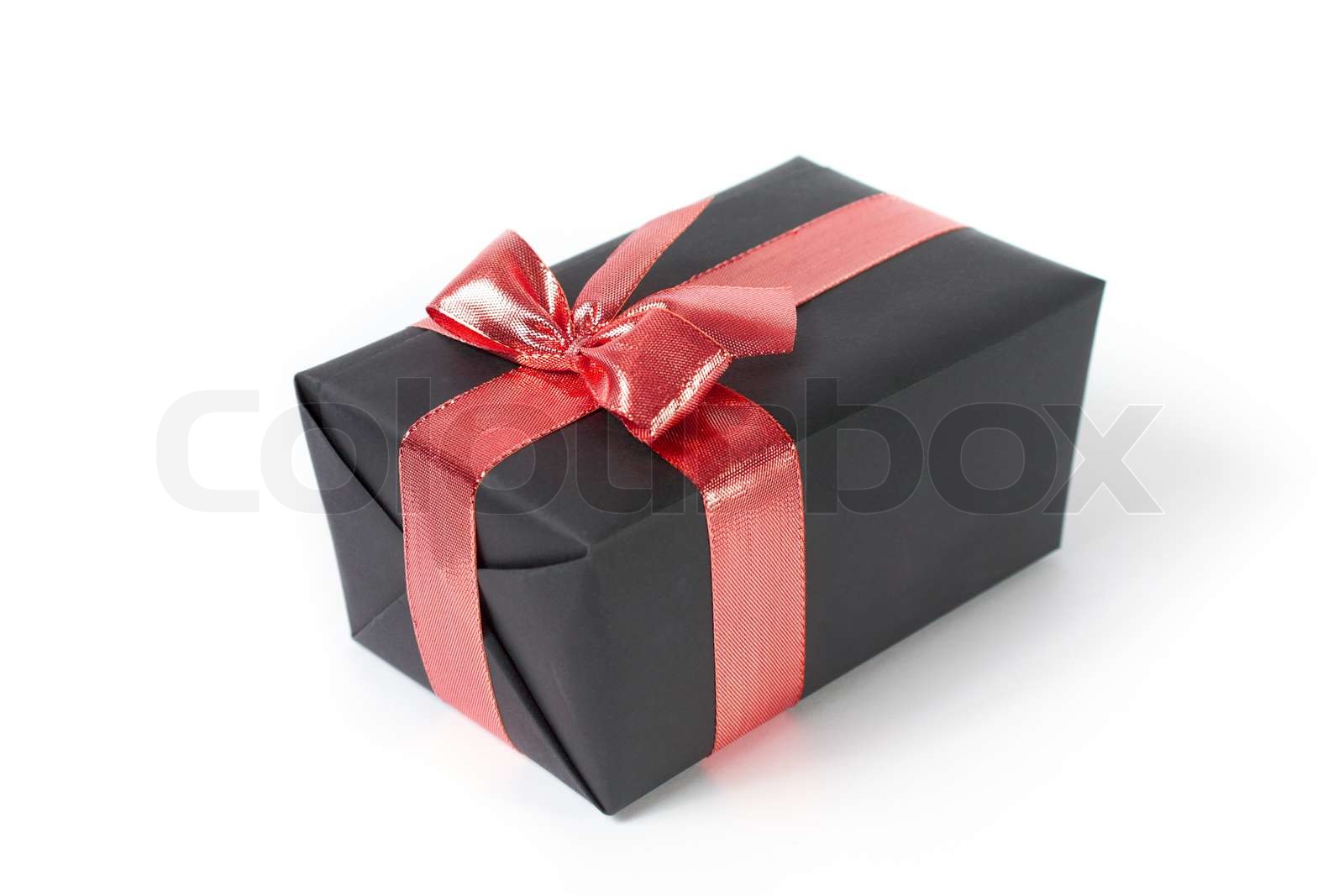 black gift box with red ribbon | Stock image | Colourbox