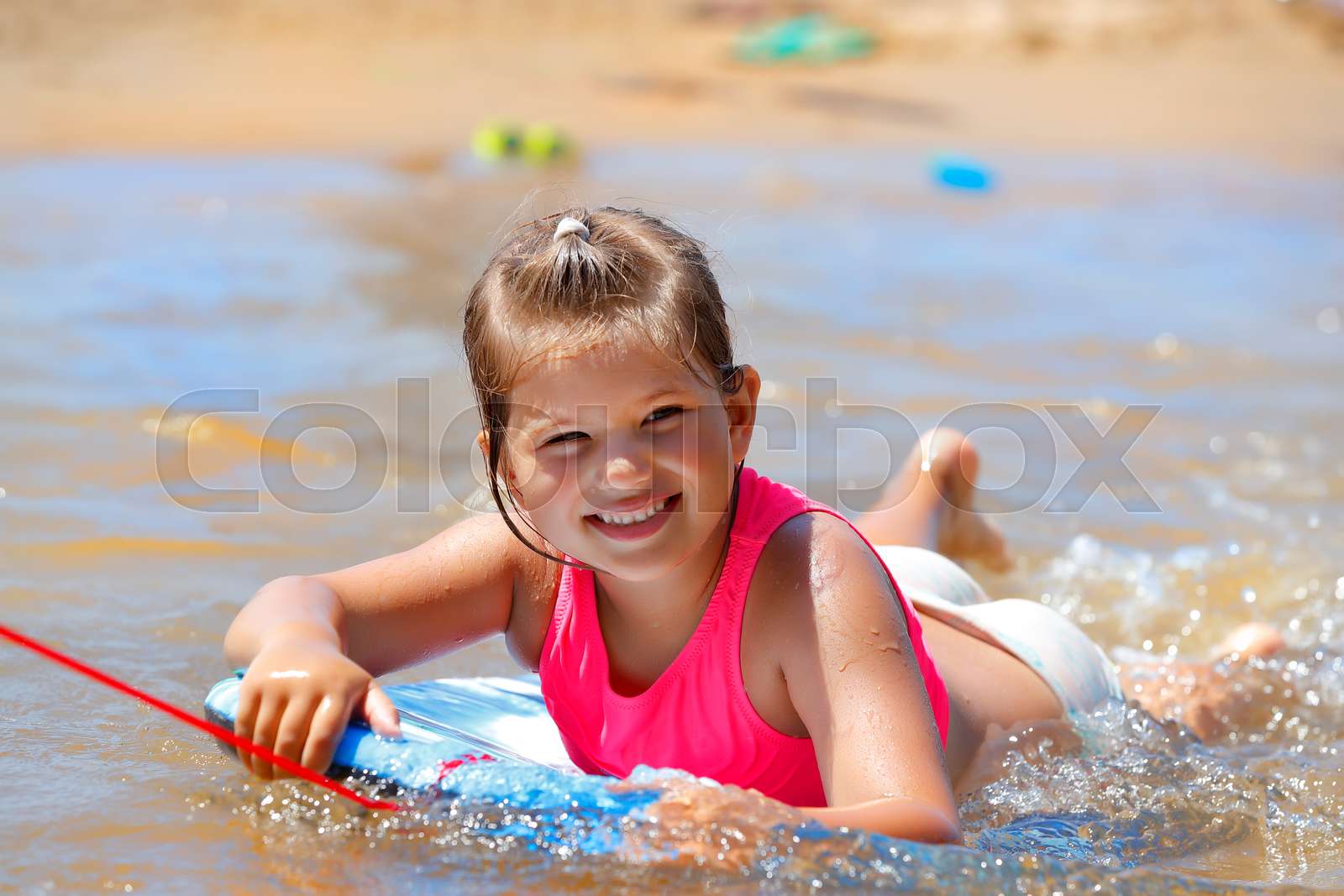 Happy Little Girl on the Beach | Stock image | Colourbox